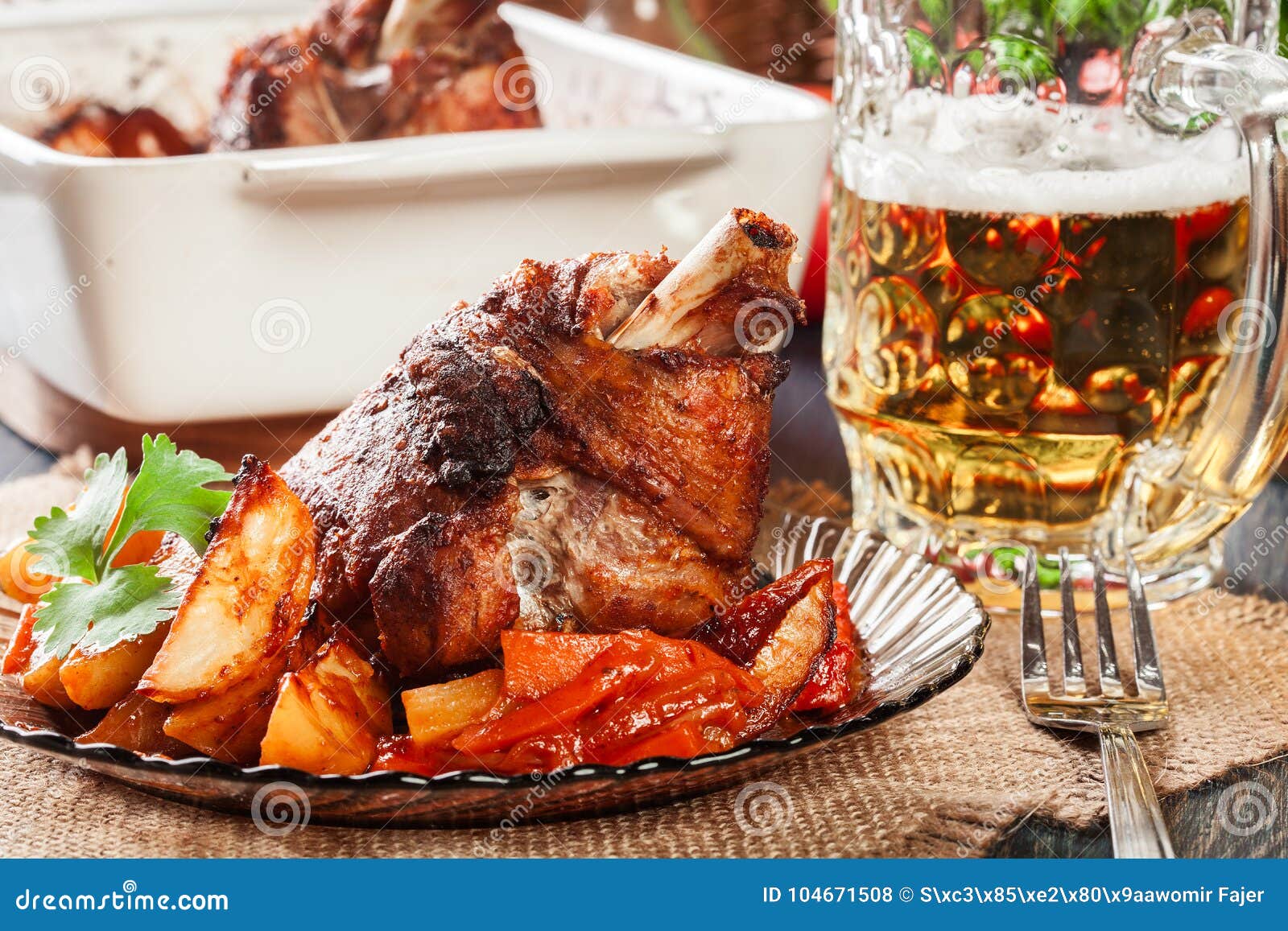 Roasted Turkey Knuckle with Potatoes and Vegetable Stock Photo - Image ...