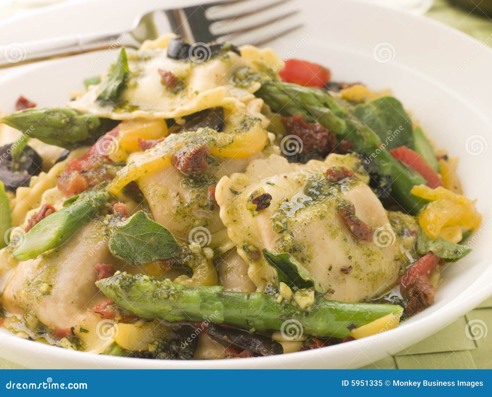 Roasted Vegetable Ravioli with Pesto Dressing Stock Image - Image of ...