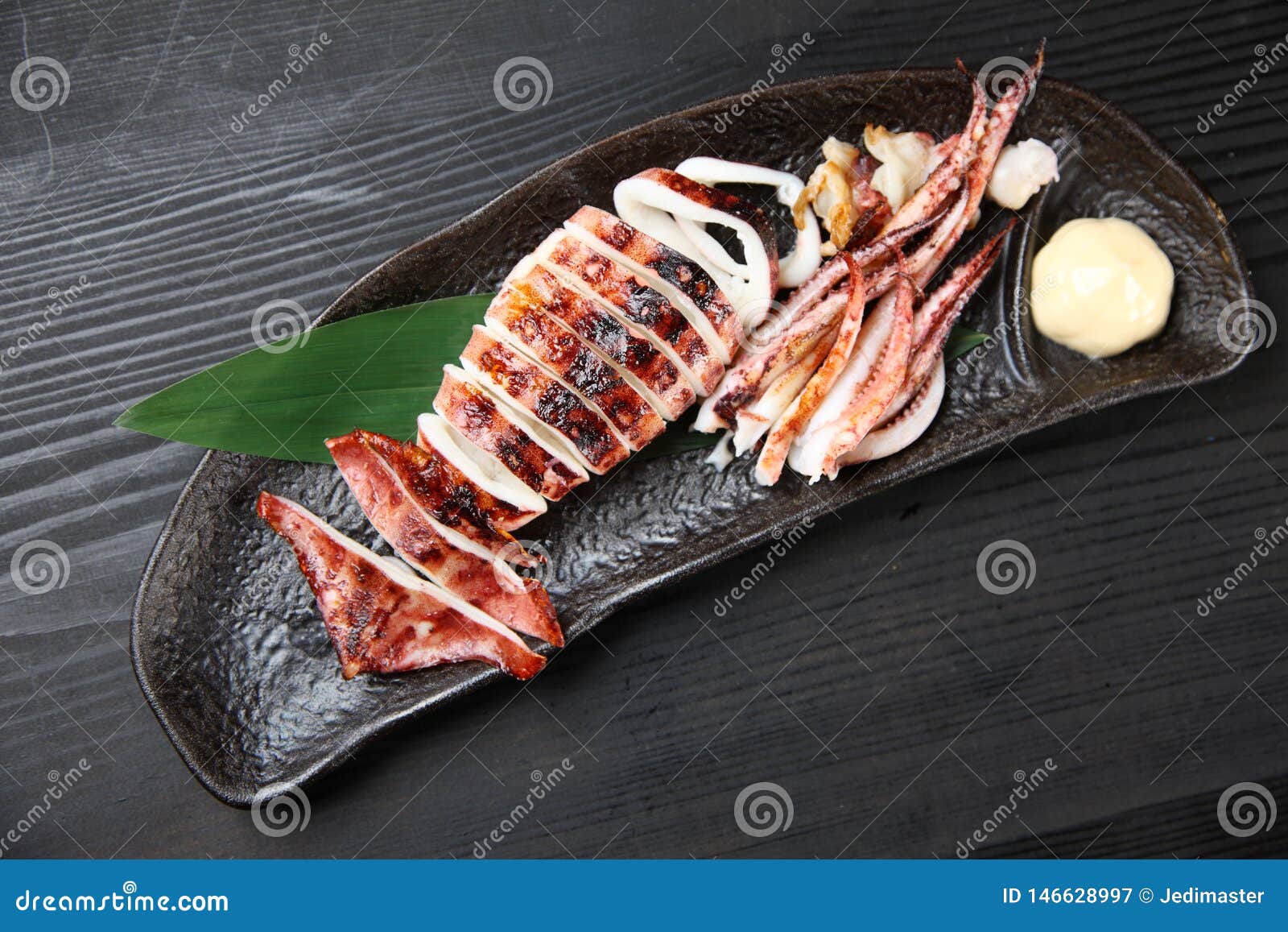 Roasted Whole Squid on a Dining Table Stock Image - Image of table ...