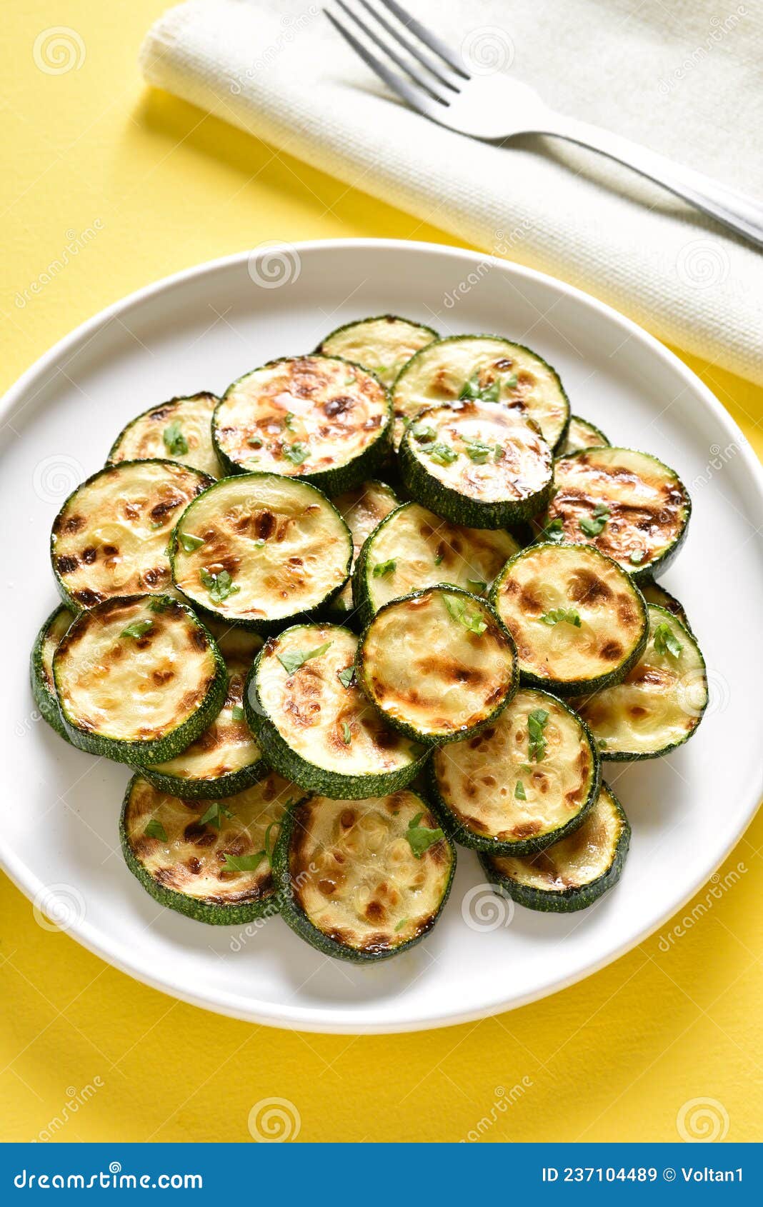 Roasted zucchini on plate stock image. Image of prepared - 237104489