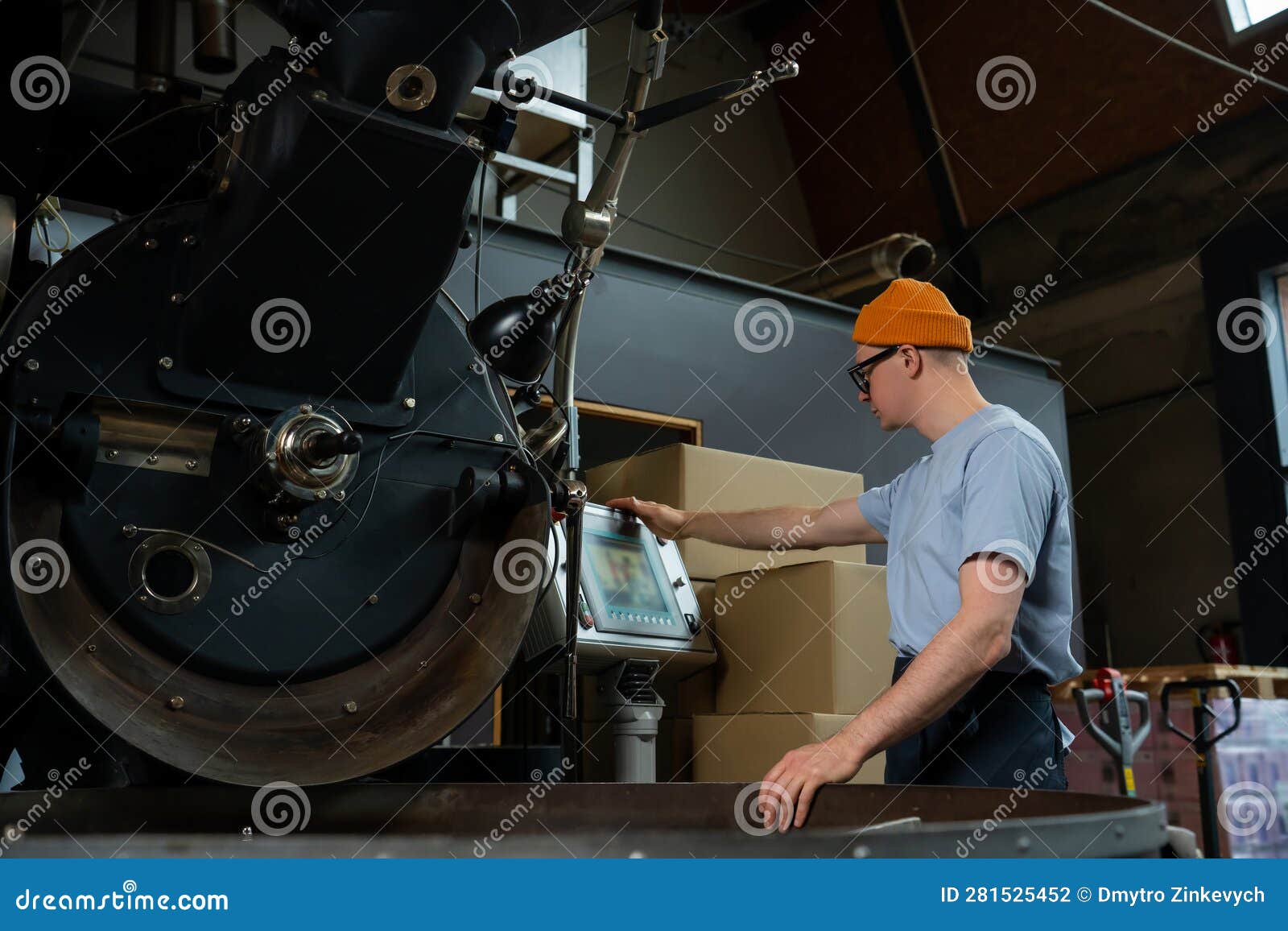 Roasting Factory Man Worker Operating Process of Creating Coffee. Stock ...