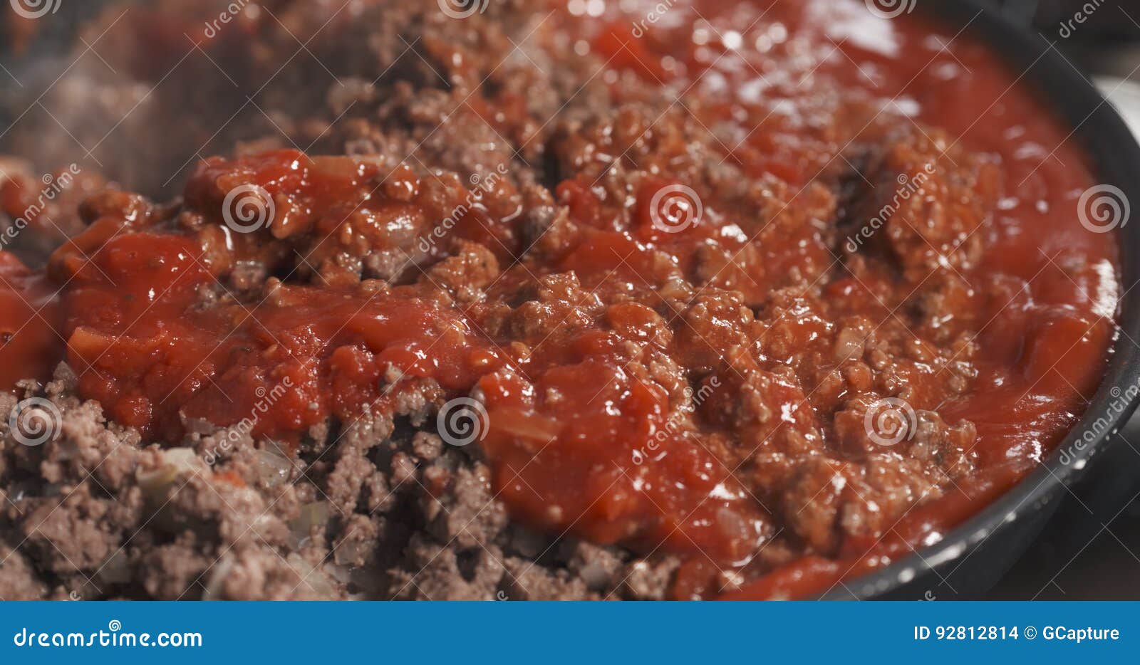 Roasting Minced Beef with Tomato Paste in a Pan Stock Photo - Image of ...