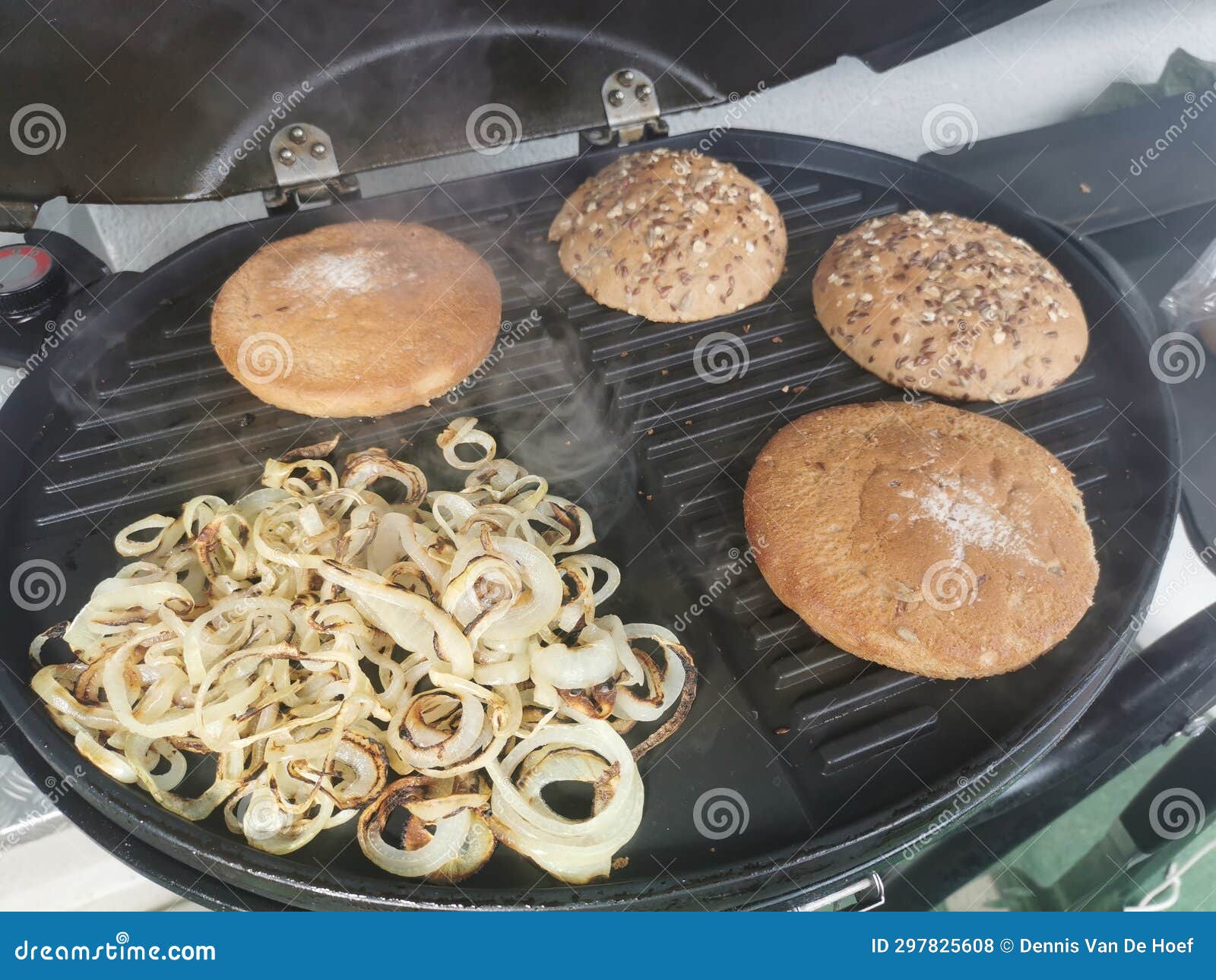 Roasting Onions and Burger Buns on an Electric Grill Stock Photo ...