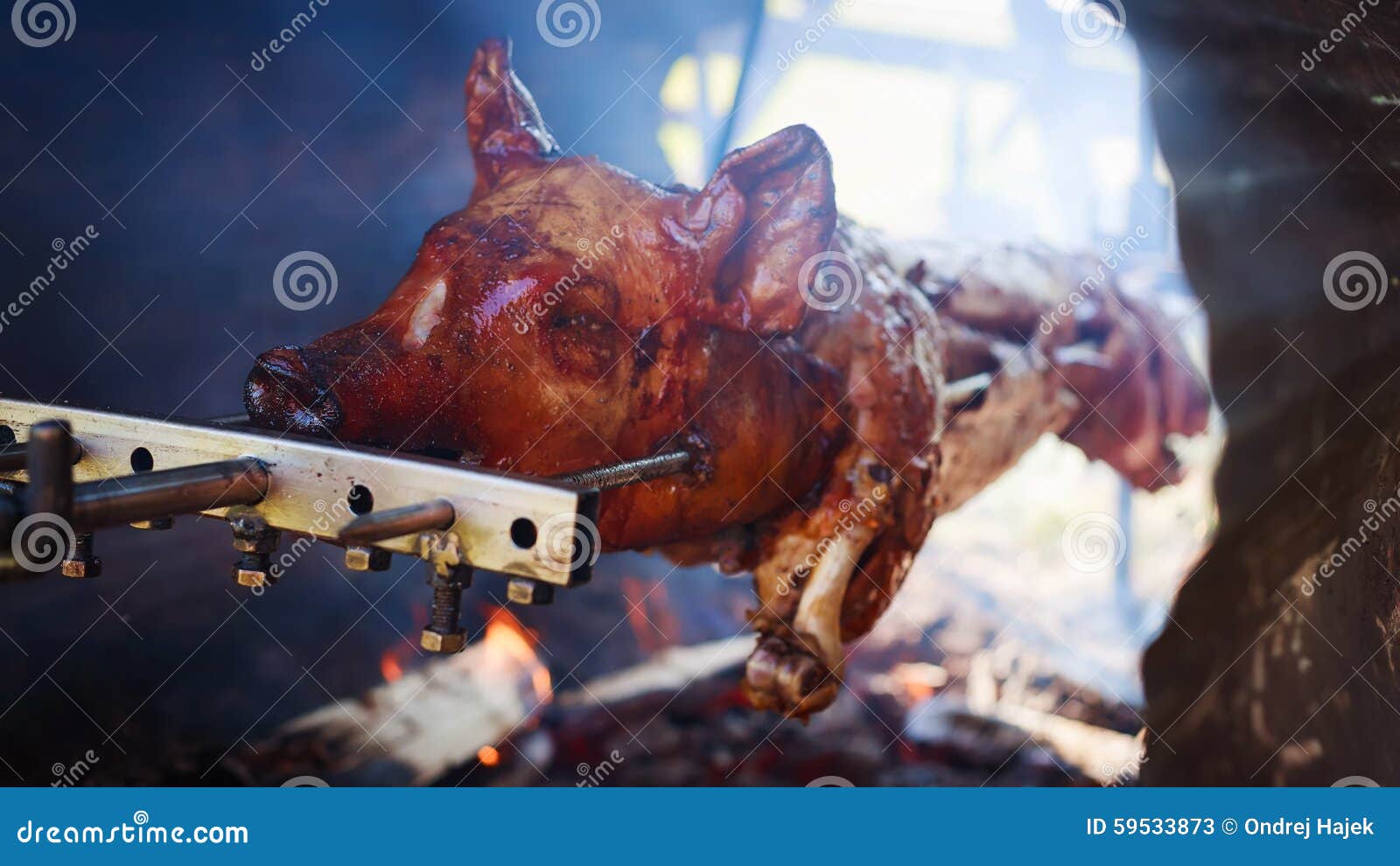 Roasting the pig stock image. Image of cooked, heat, animal - 59533873