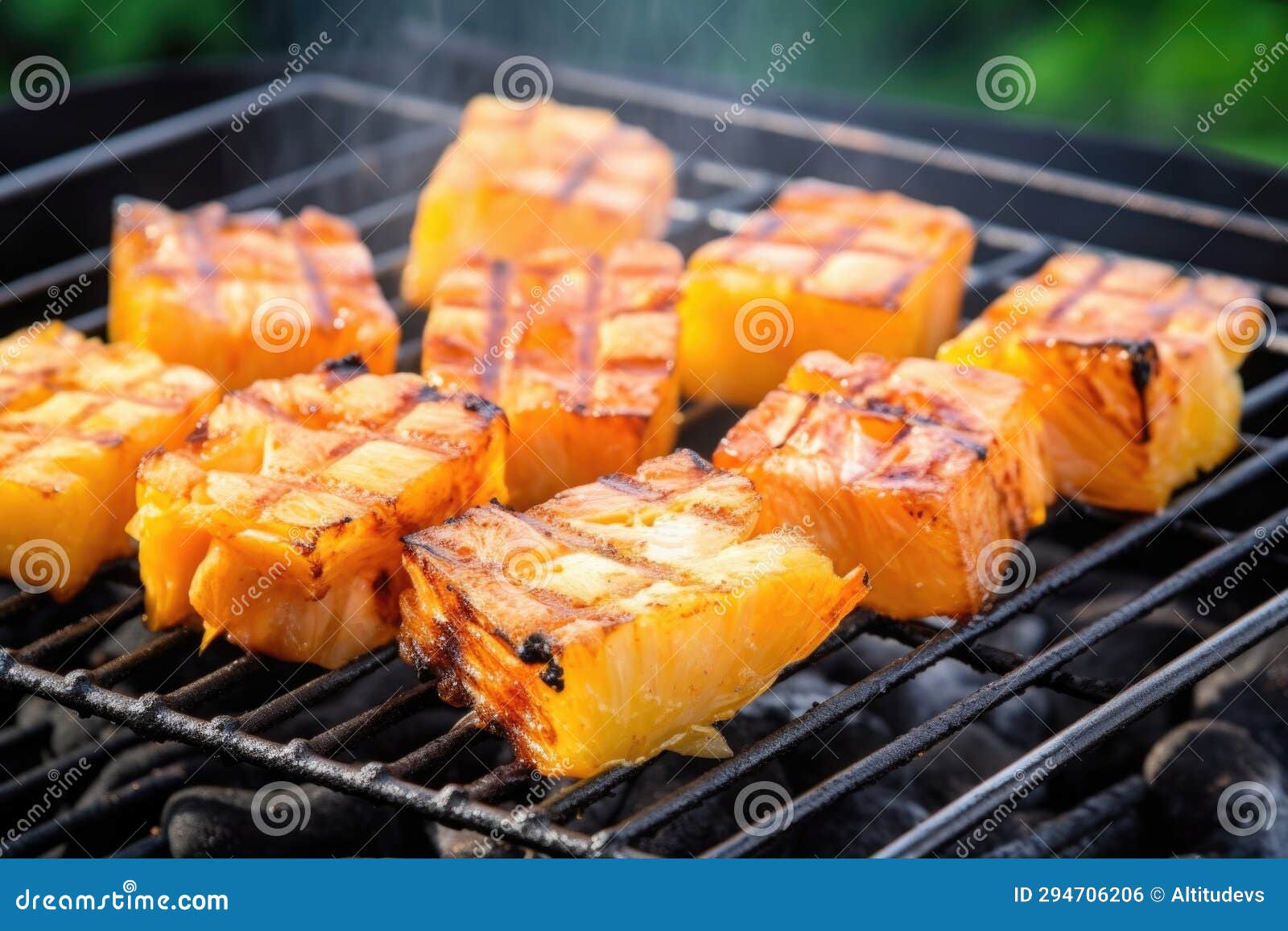 Roasting Pineapple Chunks in Grill Basket on Bbq Stock Photo - Image of ...