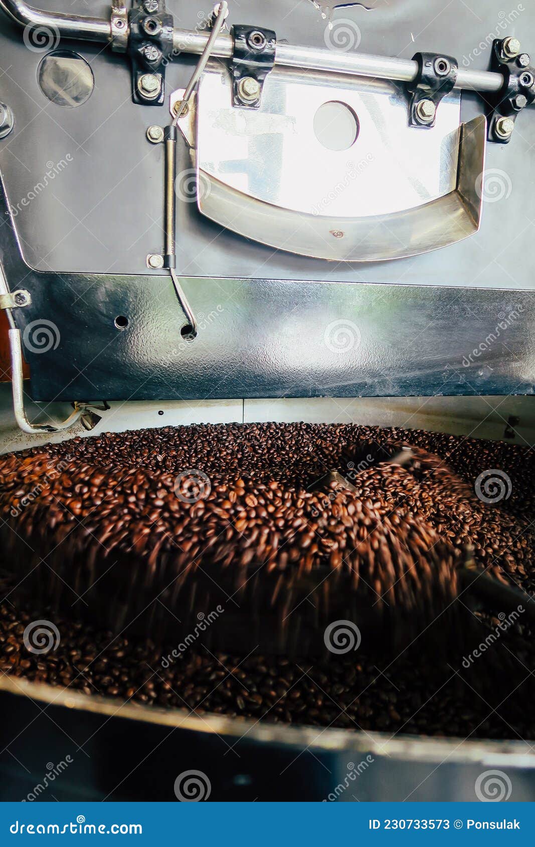 Roasting process of coffee stock image. Image of factory - 230733573