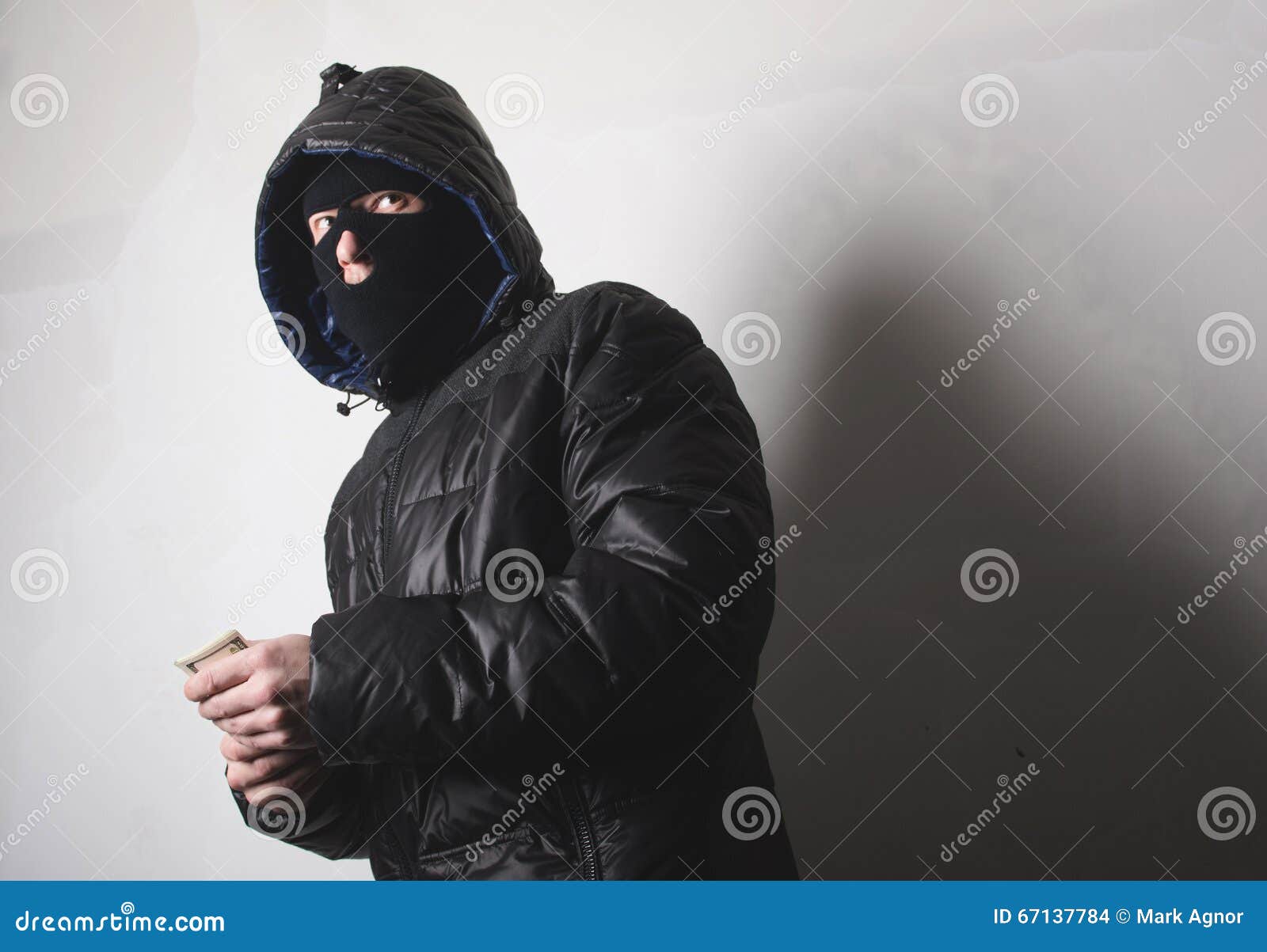 Robber with an aming gun stock photo. Image of dangerous - 67137784