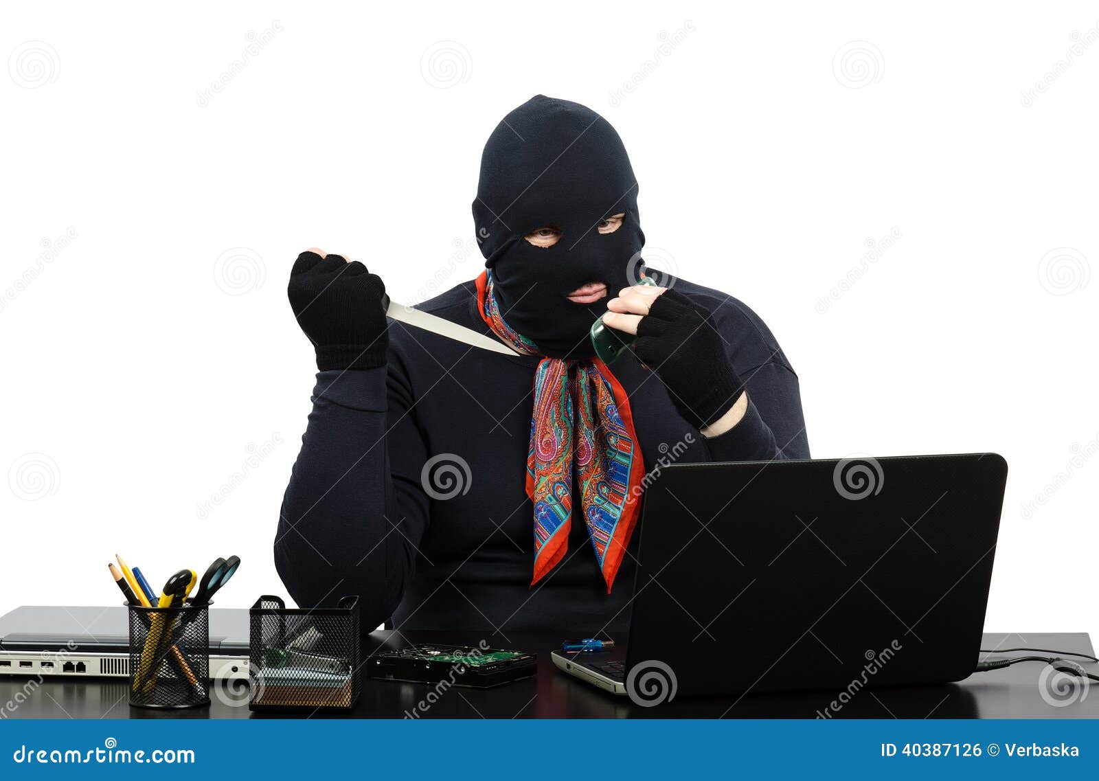 Robber In Balaclava With Knife Talking On The Cell Phone Stock Photo ...