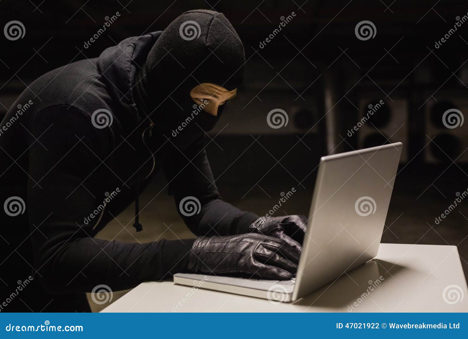 Robber at Desk Hacking a Laptop Stock Photo - Image of caucasian ...