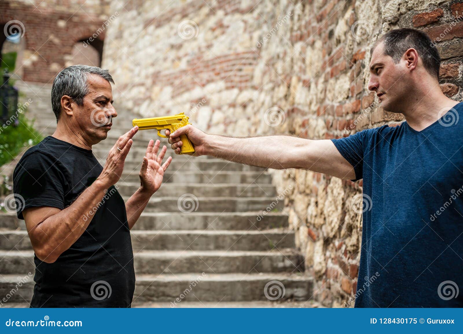 Robber with a Gun Attacks the Victim. Gun Point Stock Image - Image of ...