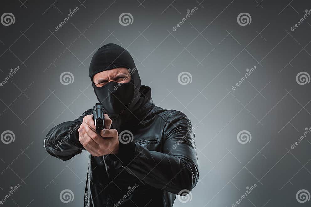 Robber with a Gun, Studio Shot Stock Photo - Image of evil, fear: 93495434