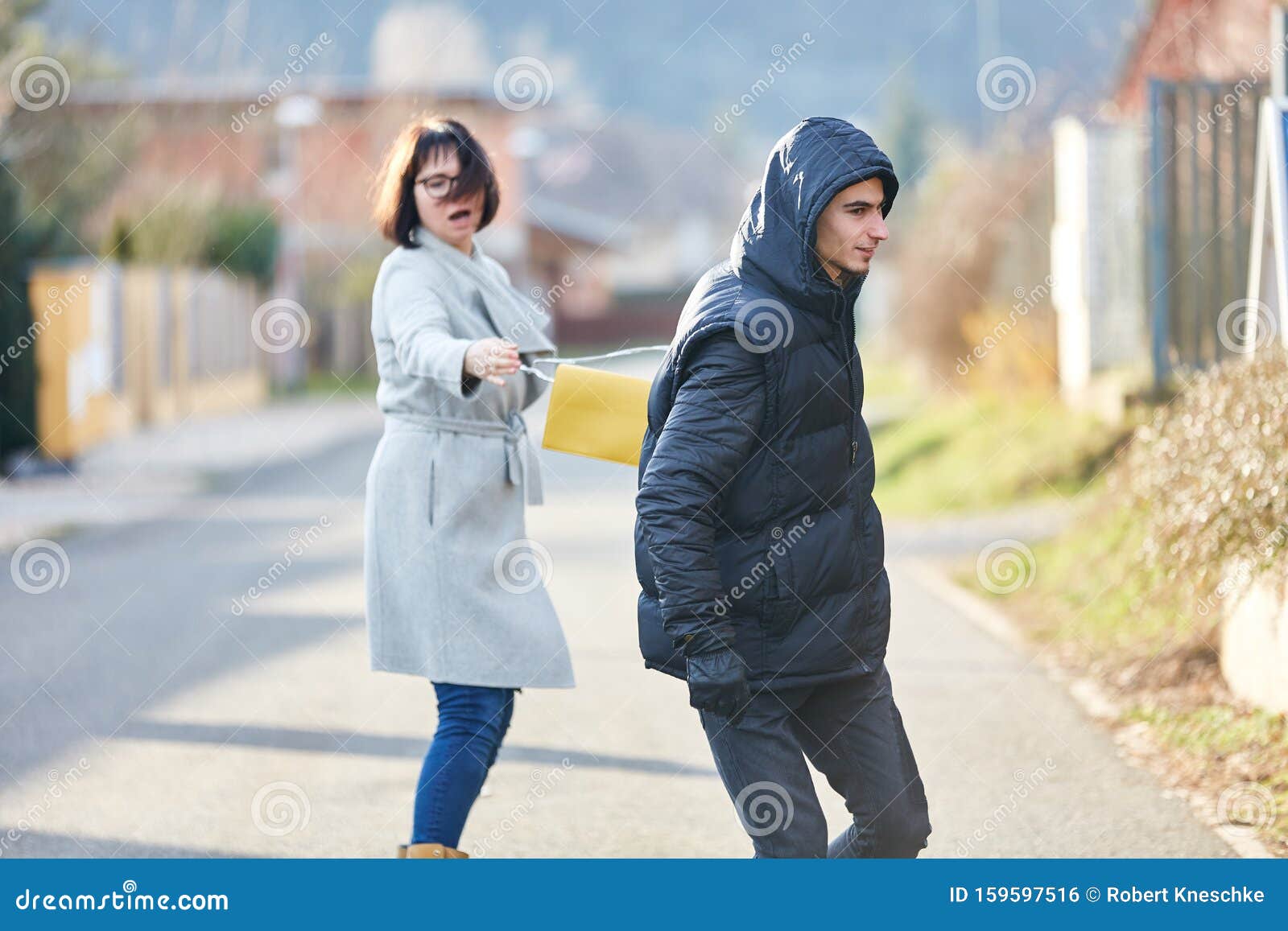 Robber in handbag robbery stock photo. Image of young - 159597516
