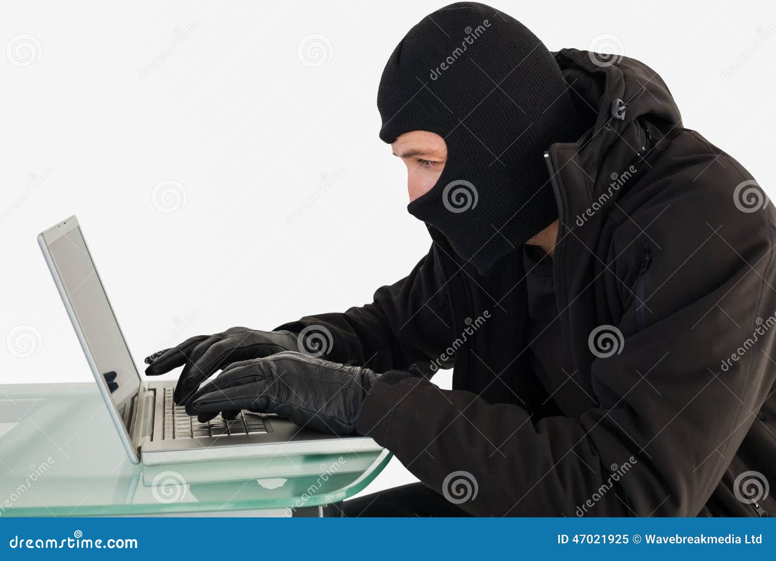 Robber Sitting at Desk Hacking a Laptop Stock Image - Image of intruder ...