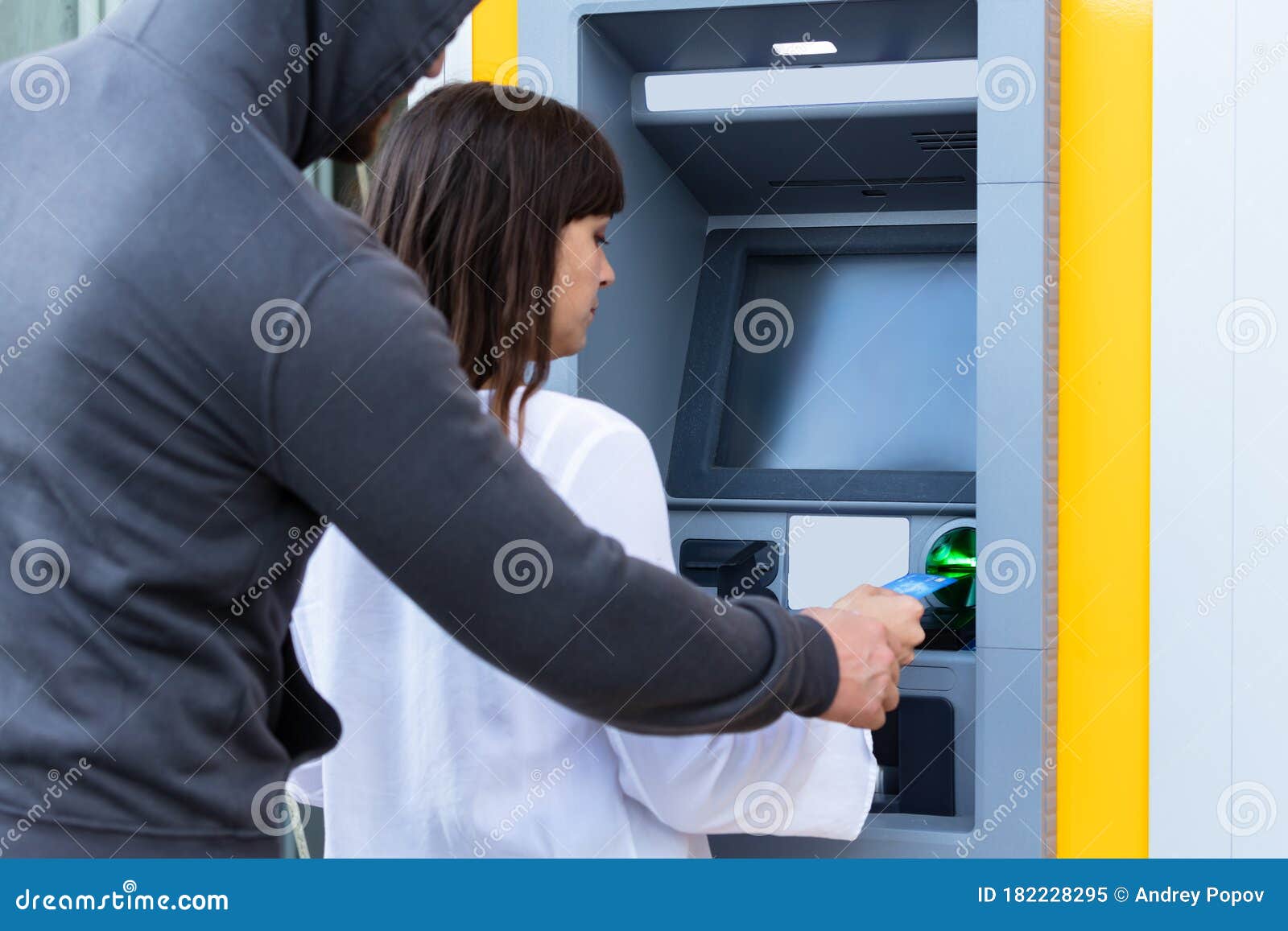 Robber Snatching Card from Woman`s Hand Using ATM Stock Image - Image ...