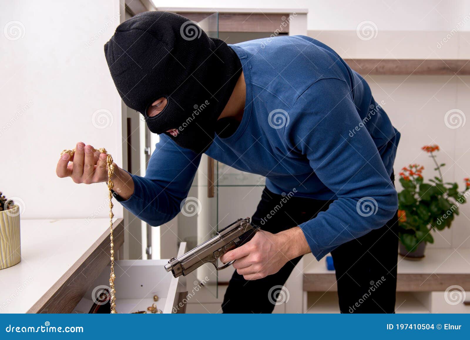 Male Robber Stealing Valuable Things from the House Stock Photo - Image ...
