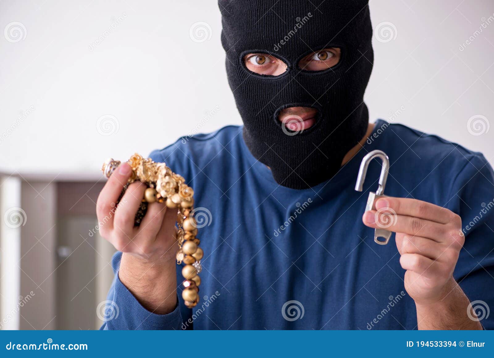 Male Robber Stealing Valuable Things from the House Stock Photo - Image ...