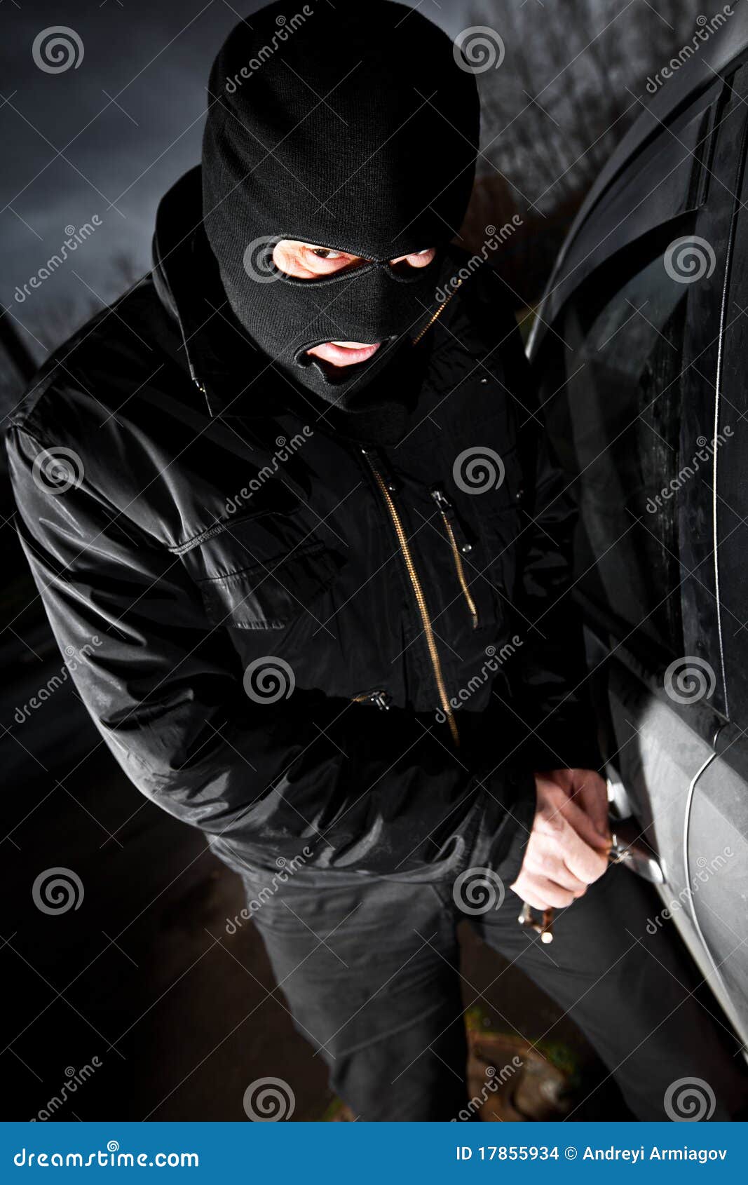 Robber and the Thief in a Mask Hijacks the Car Stock Photo - Image of ...