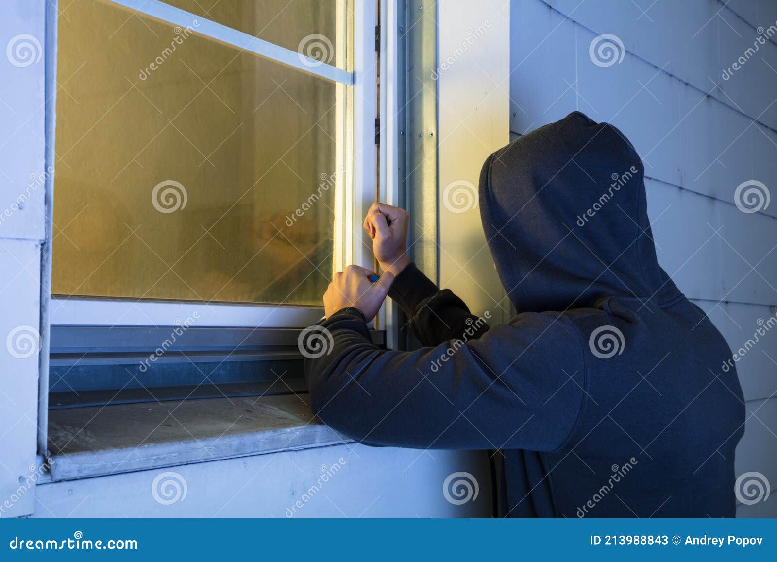 Robber Using the Crowbar To Open the Glass Window Stock Image - Image ...