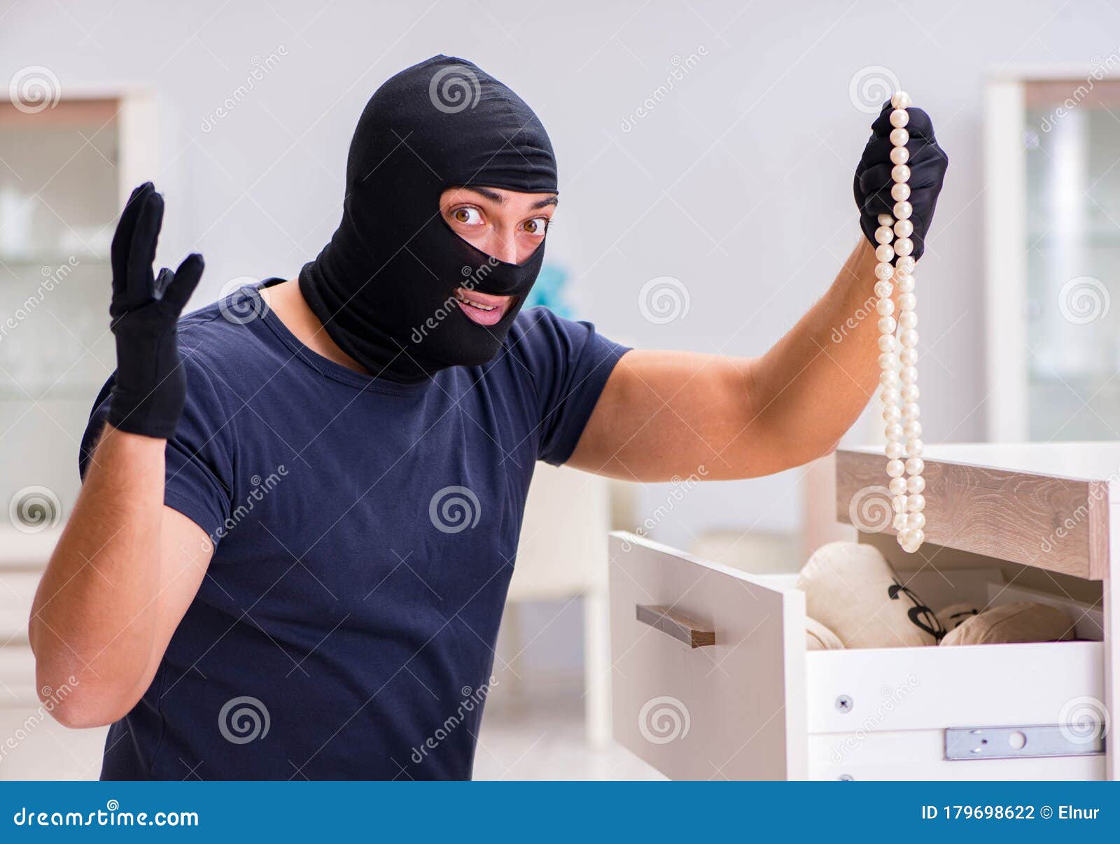 Robber Wearing Balaclava Stealing Valuable Things Stock Photo - Image ...