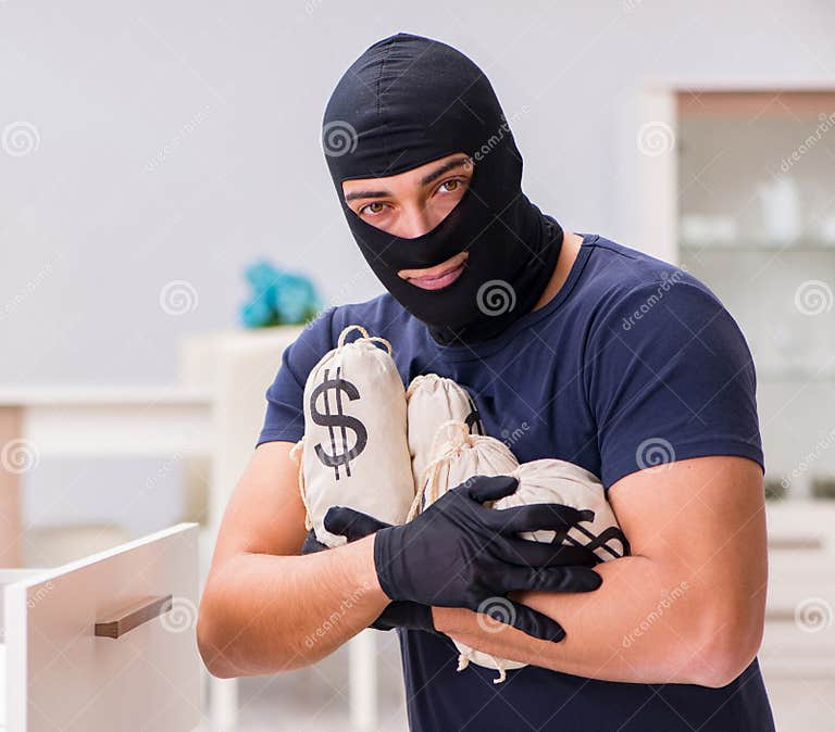 Robber Wearing Balaclava Stealing Valuable Things Stock Photo - Image ...