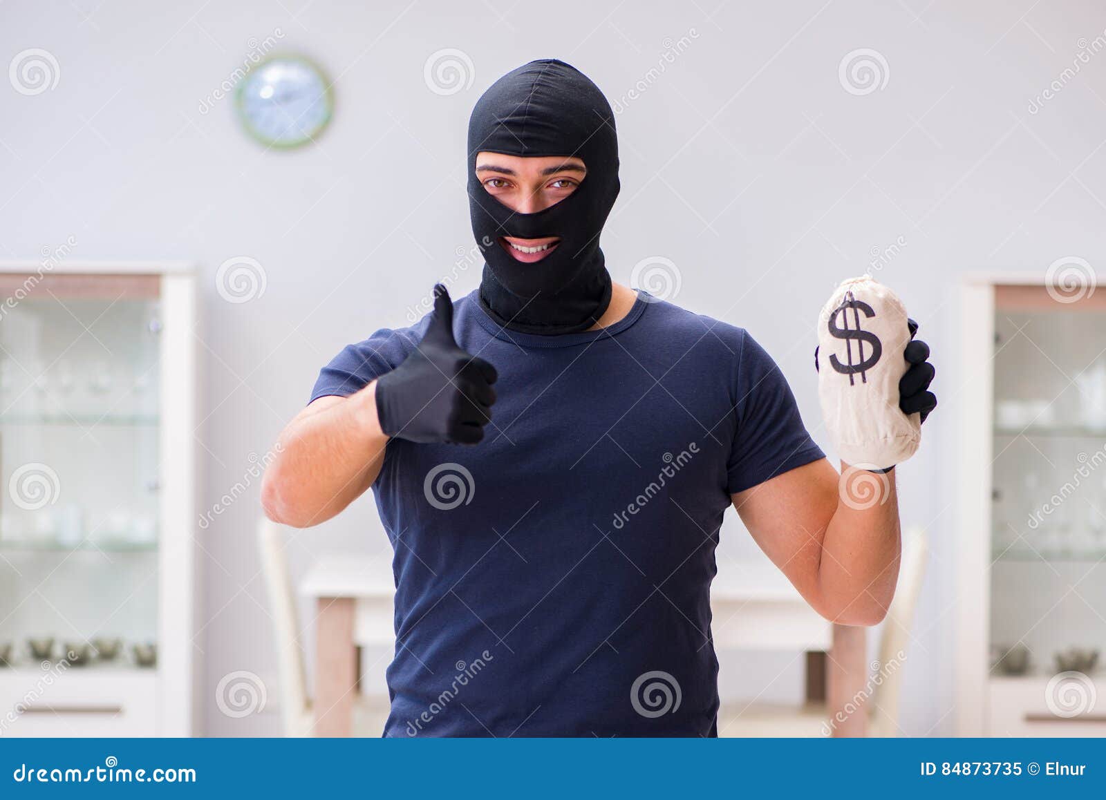 The Robber Wearing Balaclava Stealing Valuable Things Stock Image ...