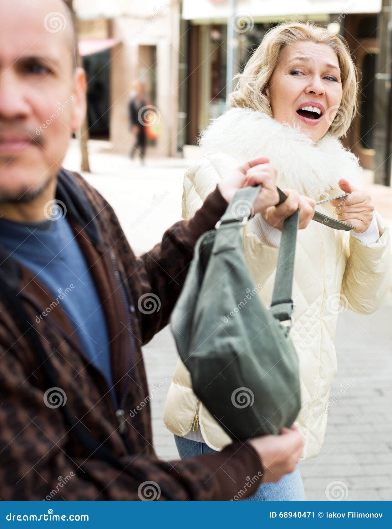 Robbery at day time stock image. Image of fall, frightened - 68940471
