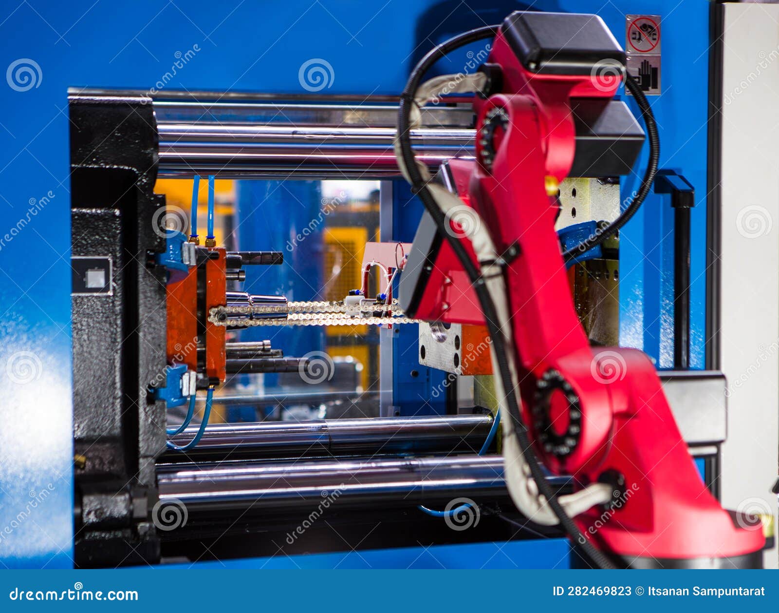 Robot Arm Remove Finish Products on Injection Molding Machine Stock ...