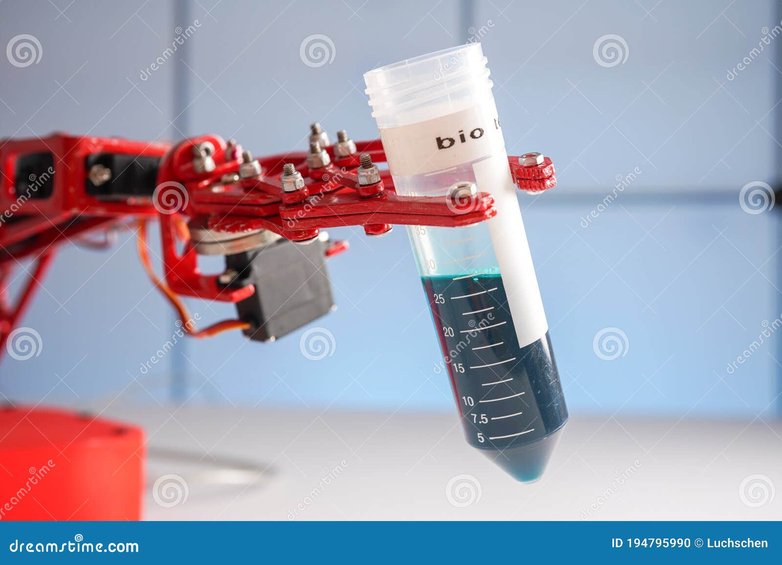 Robot Arm with Test Tube with Biological Sample in Science Laboratory ...