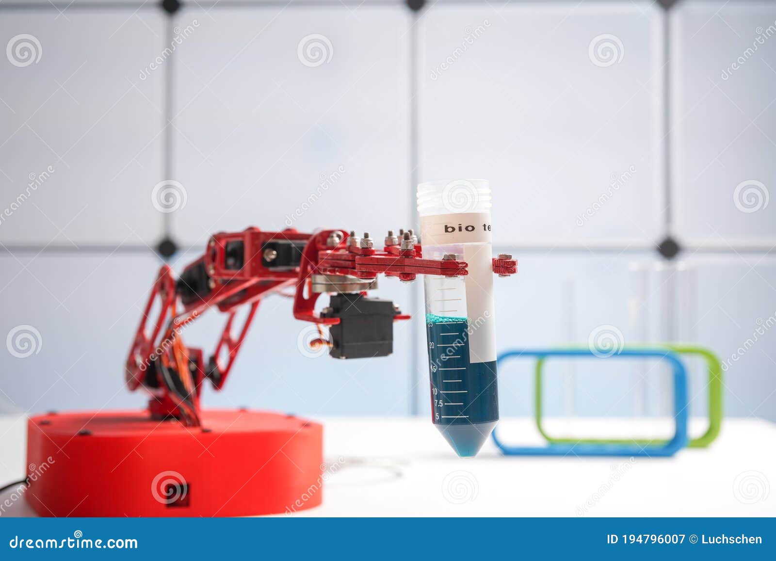 Robot Arm with Test Tube with Biological Sample in Science Laboratory ...