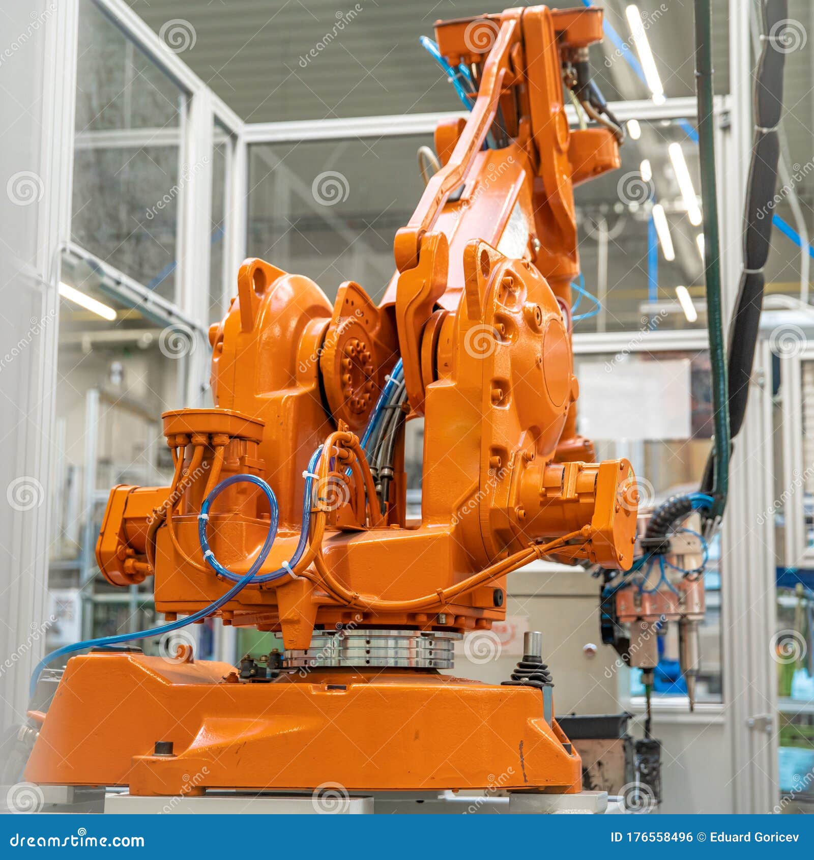 Robot Arms in the Factory Performs Precise Work According To the ...