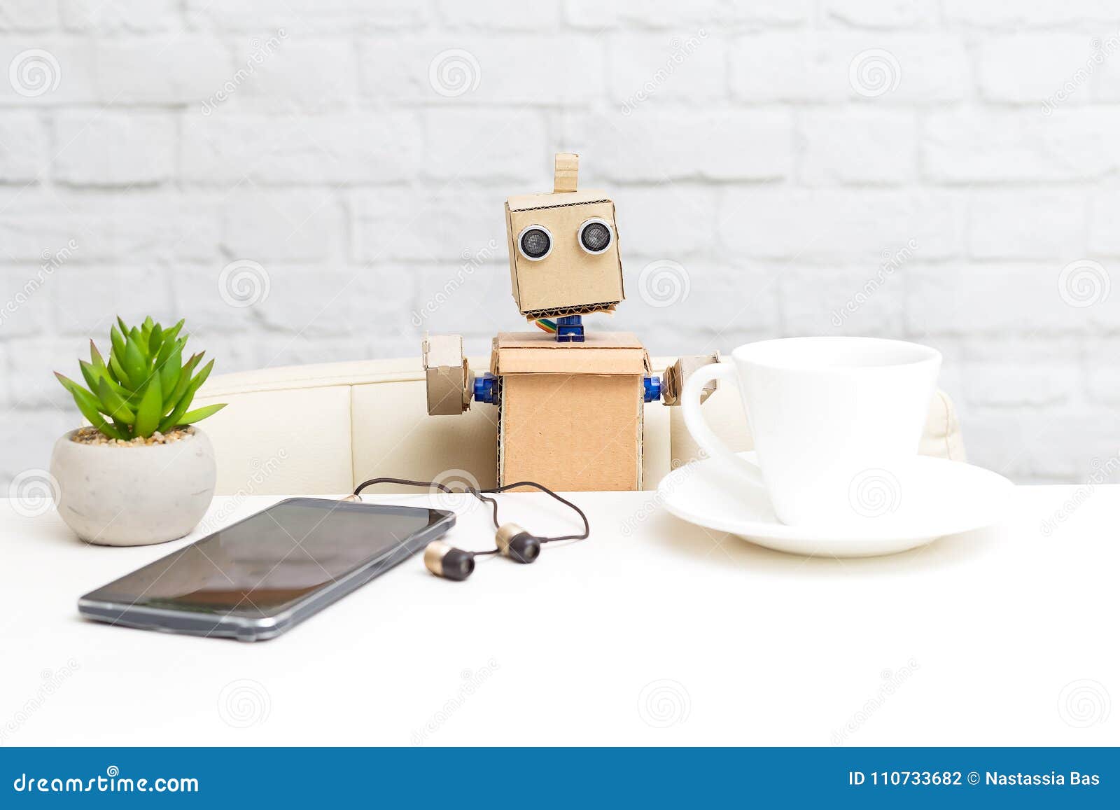A Robot and a Cup of Coffee. Artificial Intelligence Stock Photo ...