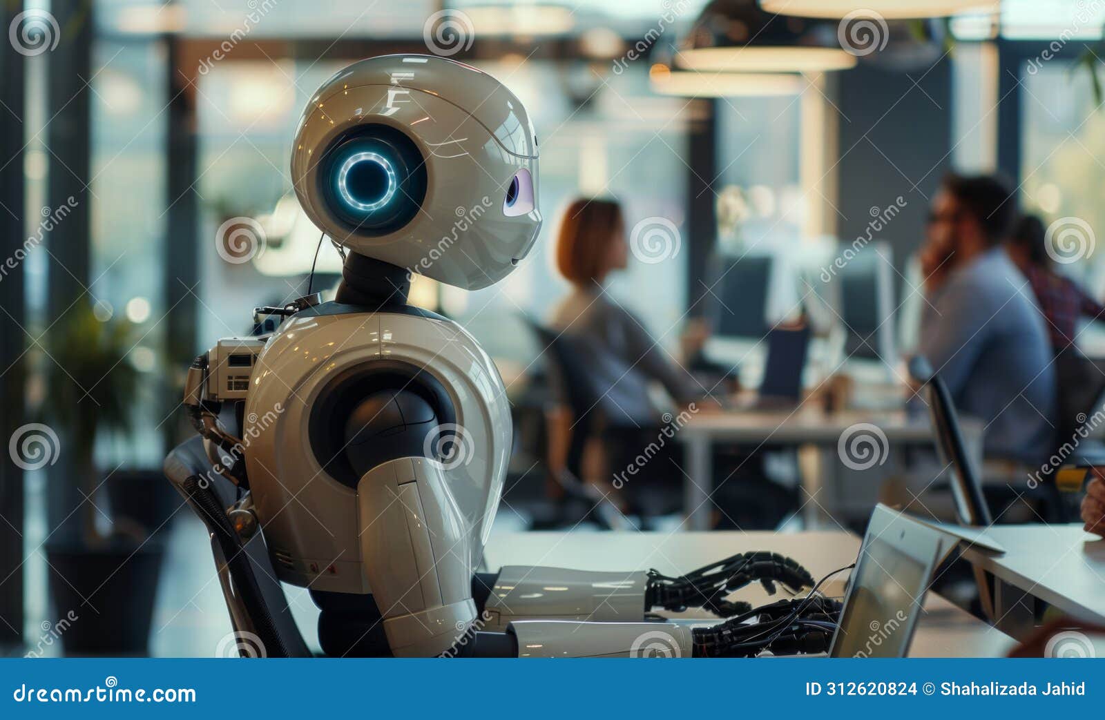 A Robot is at a Desk with a Laptop Computer, Part of Engineering ...