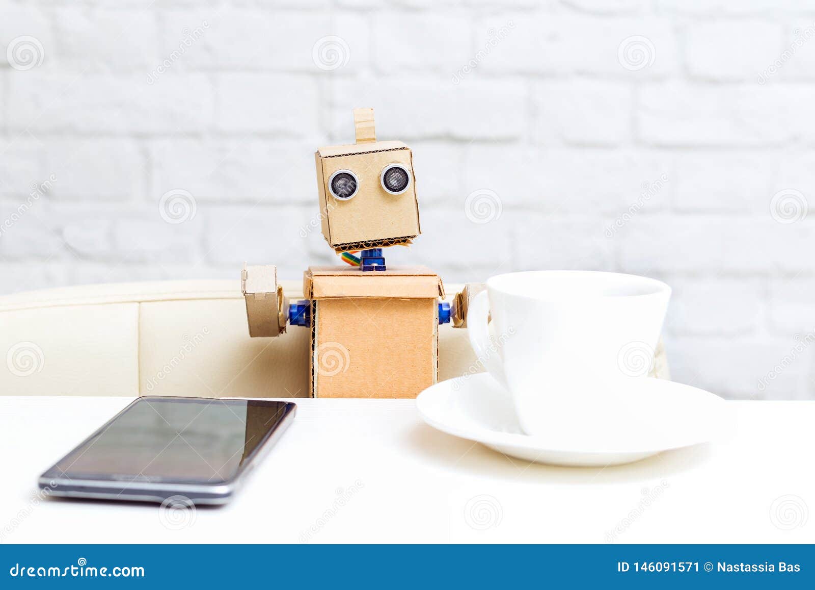 The Robot is Drinking Coffee at the Table. the Future of Technology ...