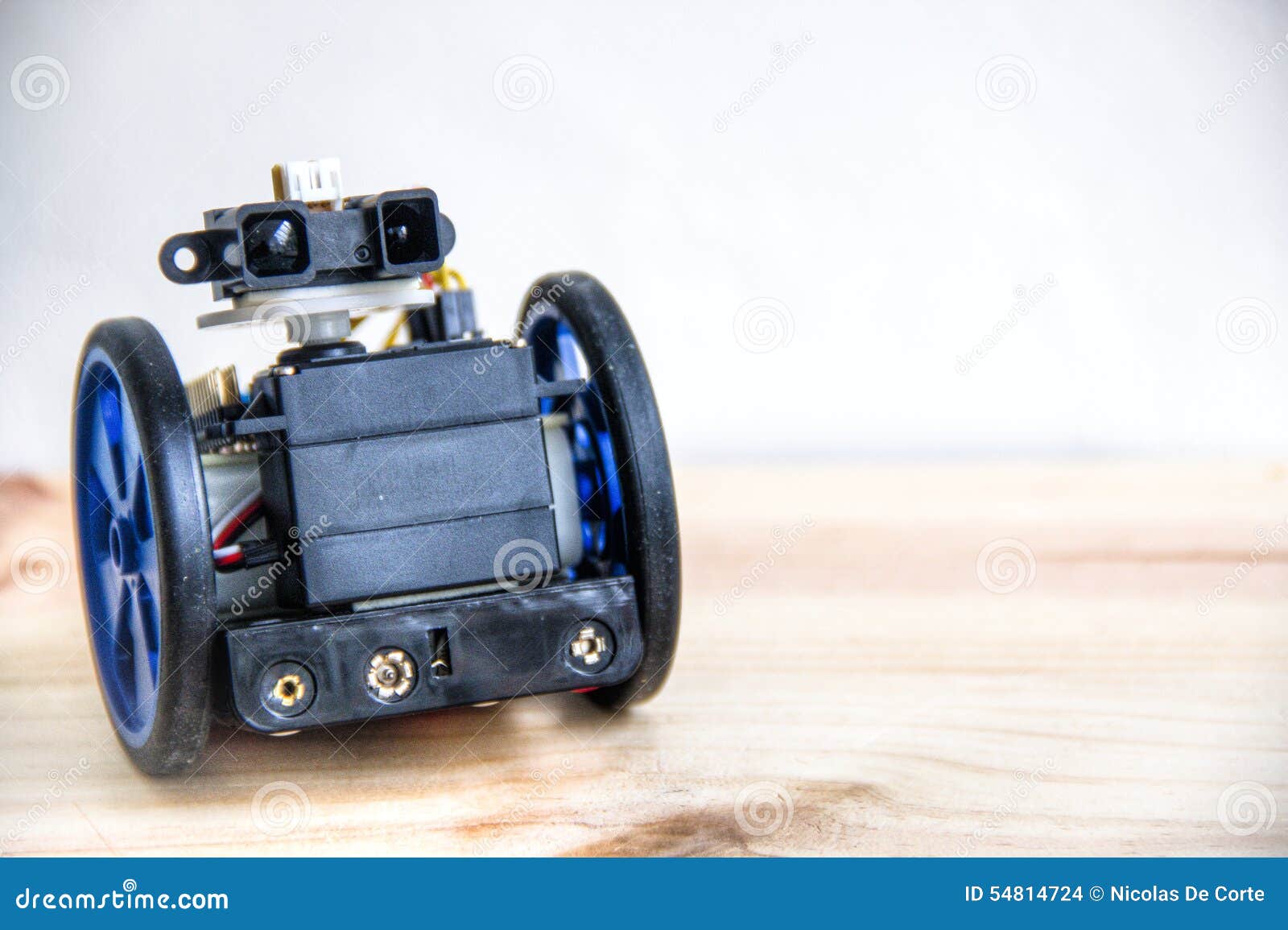 Robot On Wheels On A White Background. Artificial Intelligence Royalty ...
