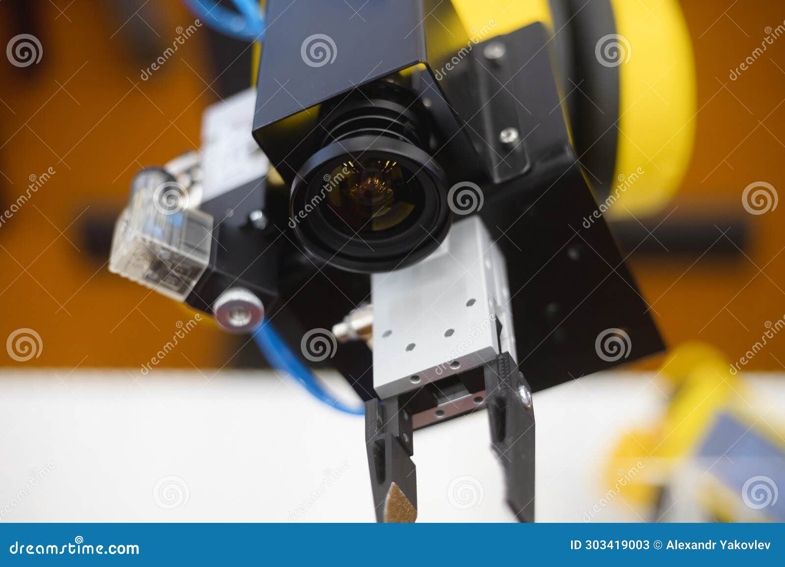 A Robot in a Factory Equipped with a Machine Vision Camera Stock Image ...