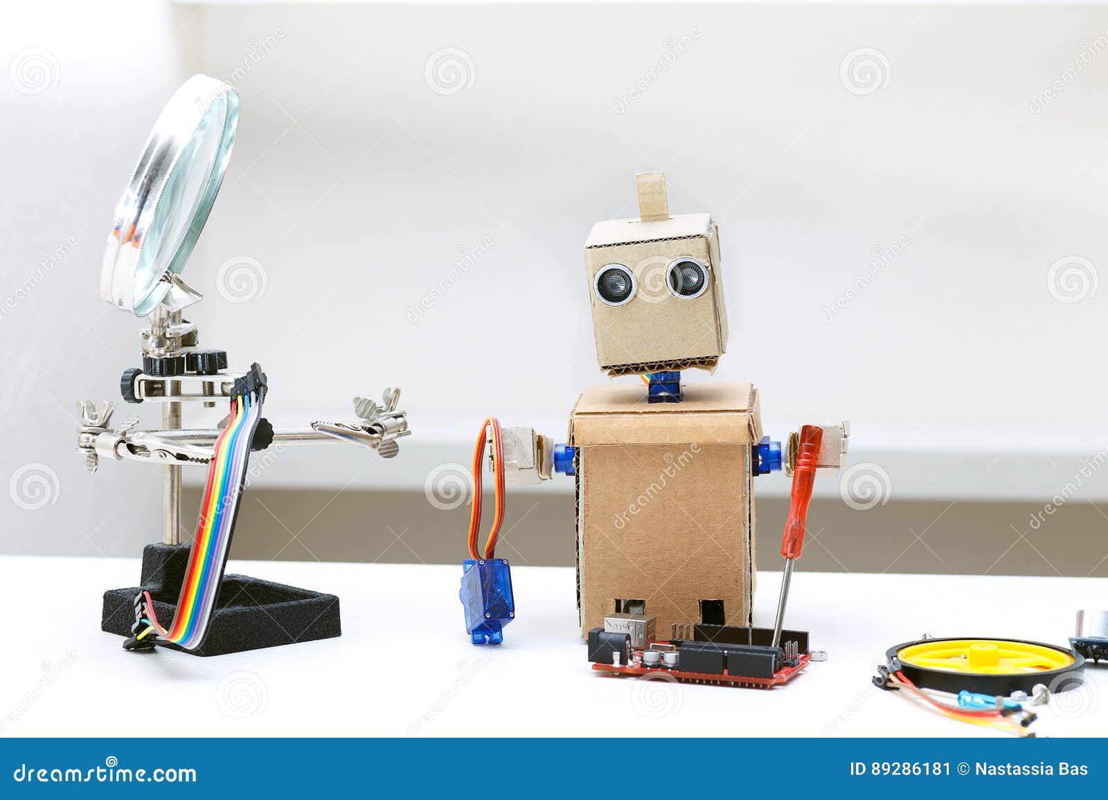 Robot with Hands and Other Parts for Assembling the Robot are on Stock ...