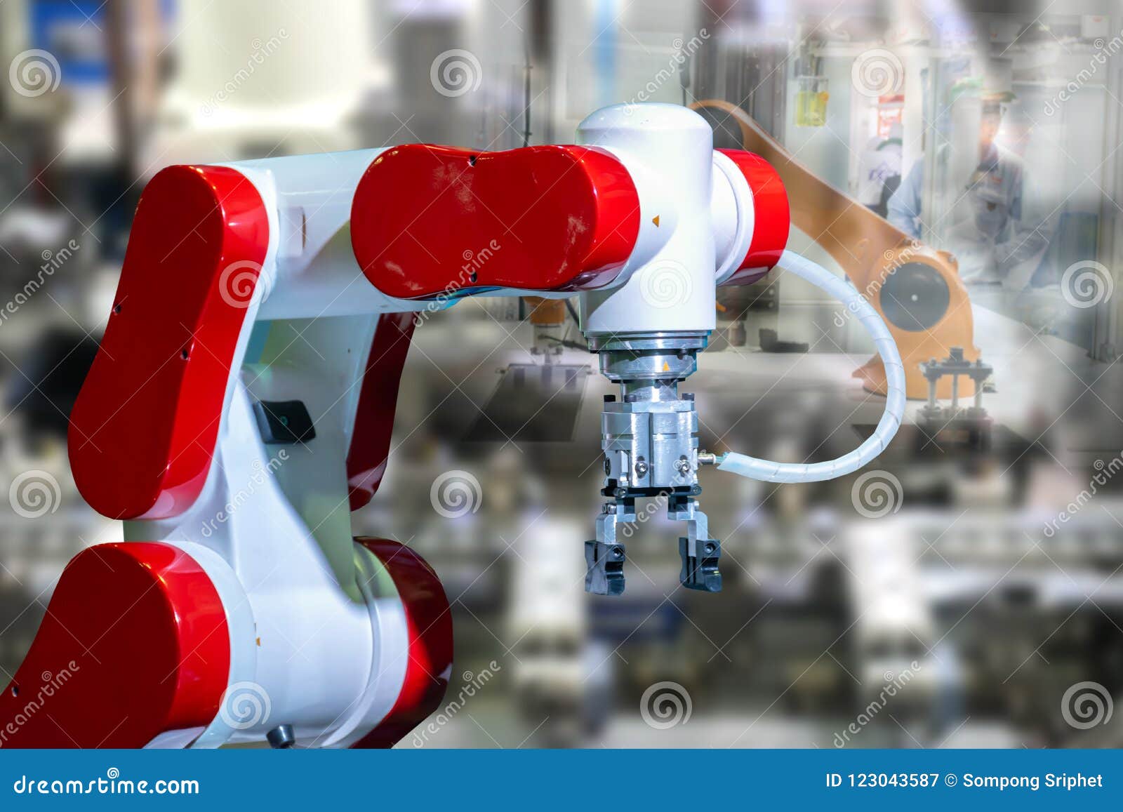 Robot Industrial 4.0 of Things Technology Robot Arm and Man Using ...