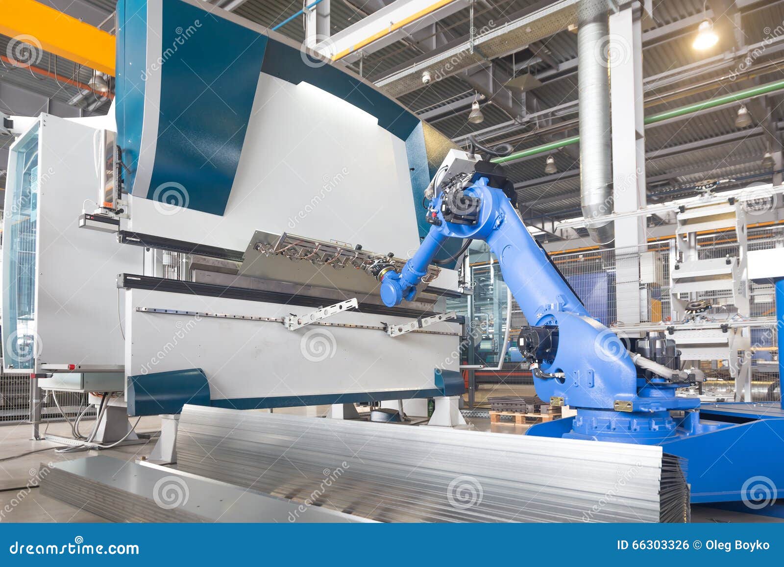 Robot Installation for Bending of Metal Stock Photo - Image of action ...