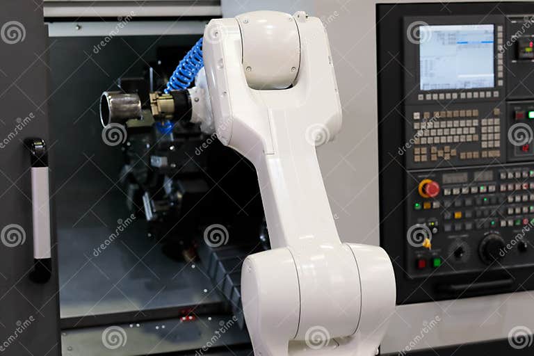 Robot Loading the Workpiece into CNC Lathe Machine Stock Image - Image ...