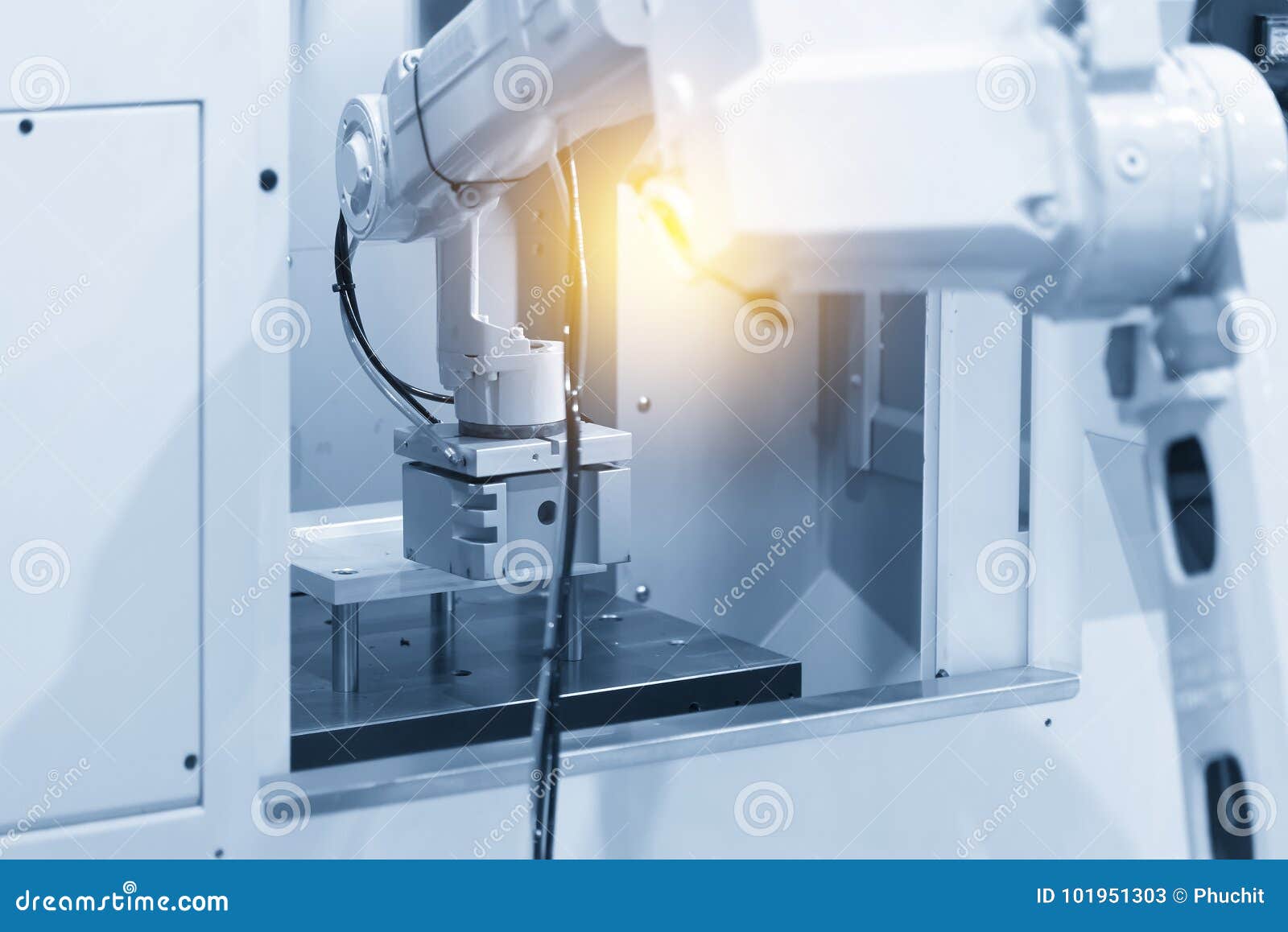 The Robot in Modern CNC Machine Operation. Stock Image - Image of ...