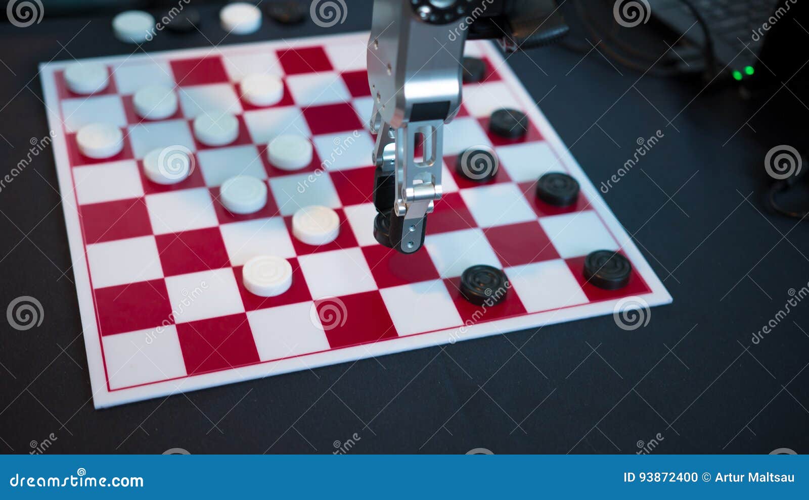 Robot Playing Checkers. Hand Manipulator Moves Checkers. Stock Photo ...