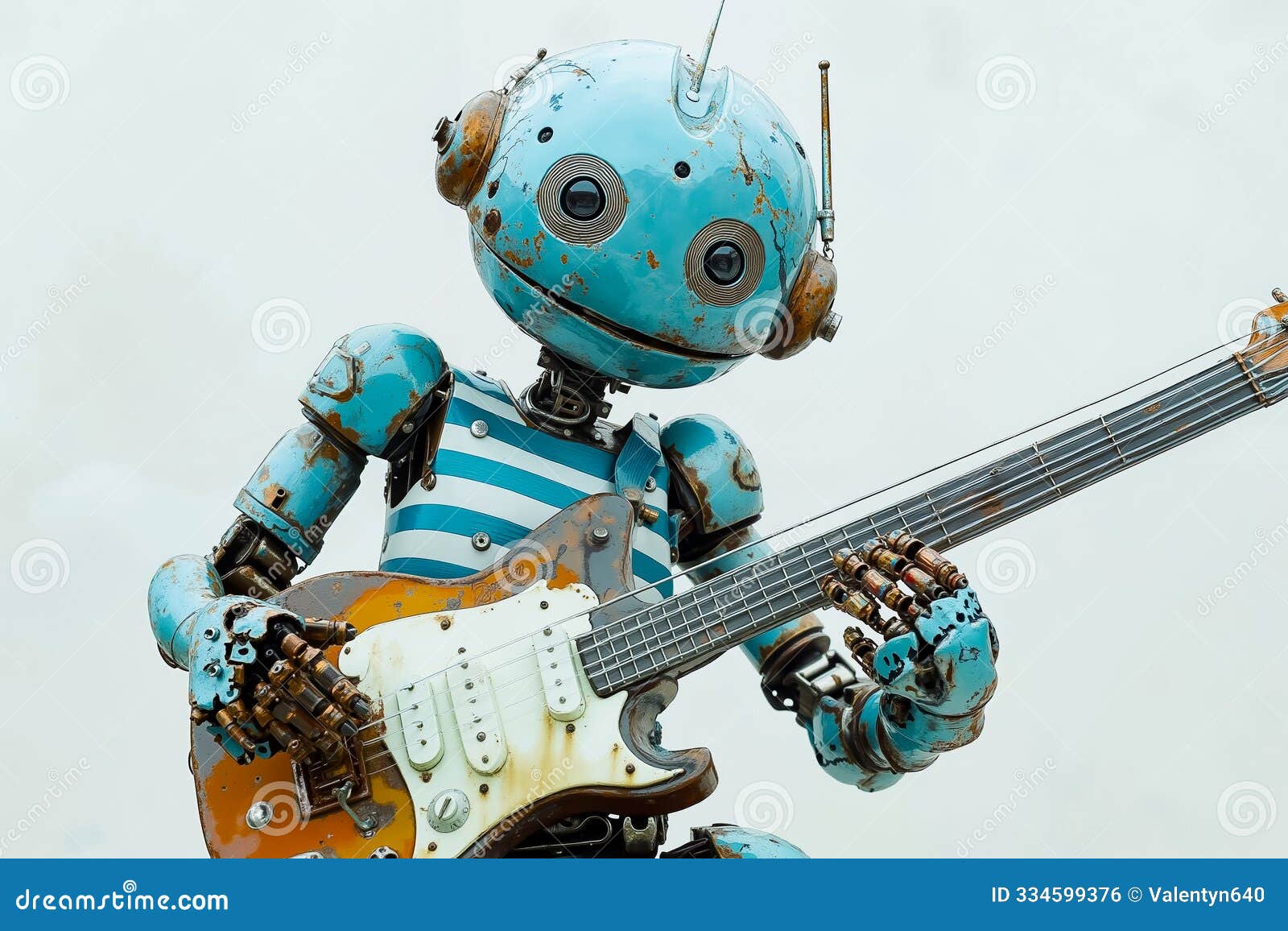 A Blue Robot Playing a Guitar on Top of a Building Stock Photo - Image ...