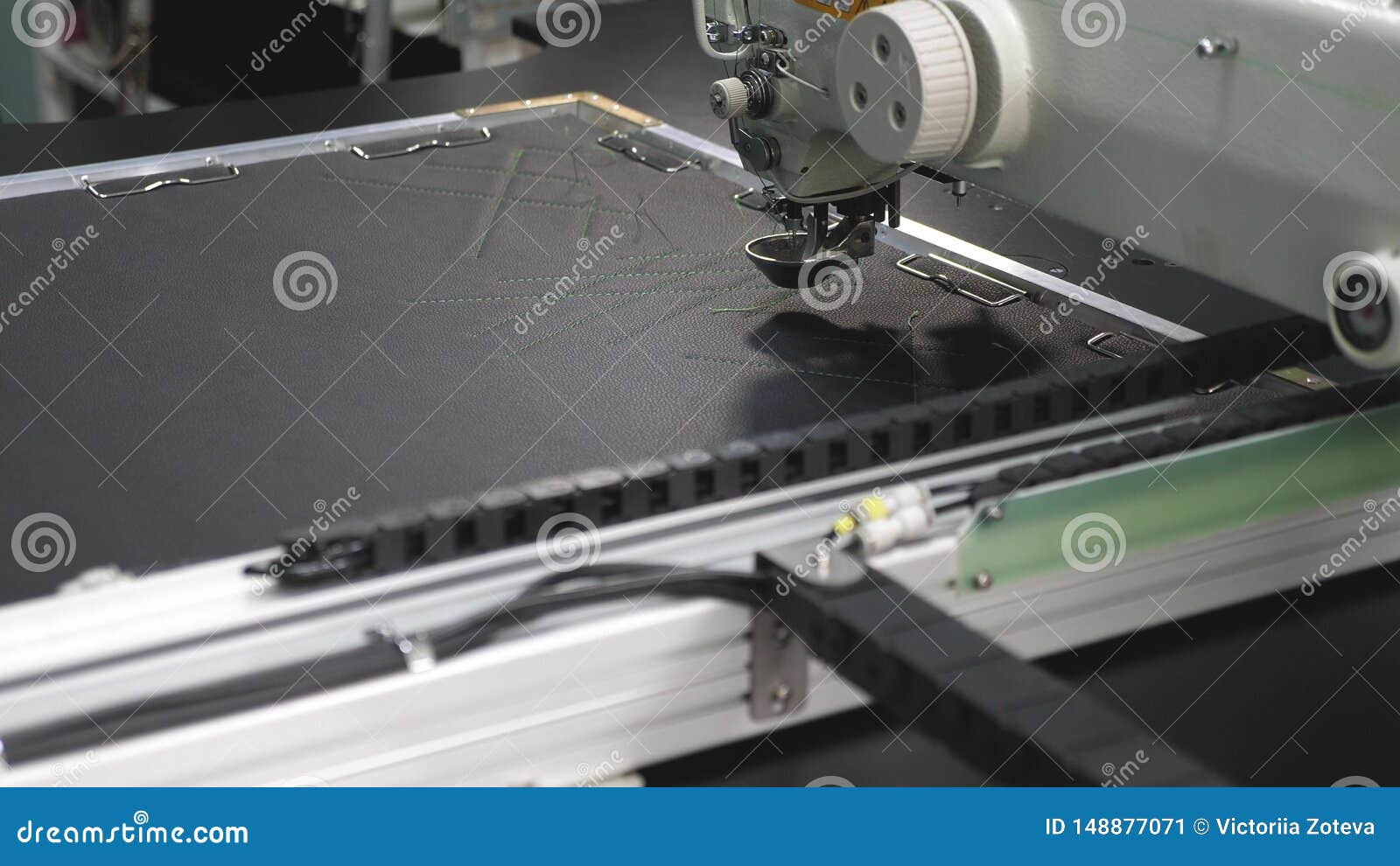 Robot Sewing Machine. Computer Controls the Sewing Machine. Automatic ...