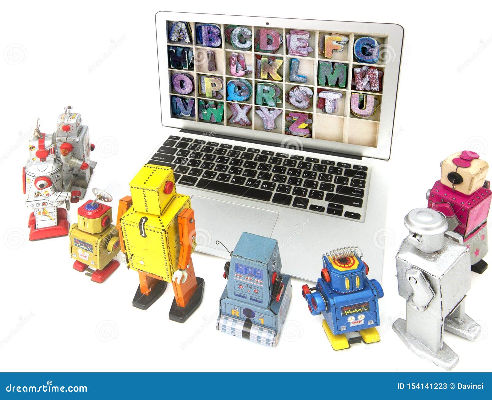 Robot Toys Learing ABC on a Laptop Computer Stock Image - Image of toys ...