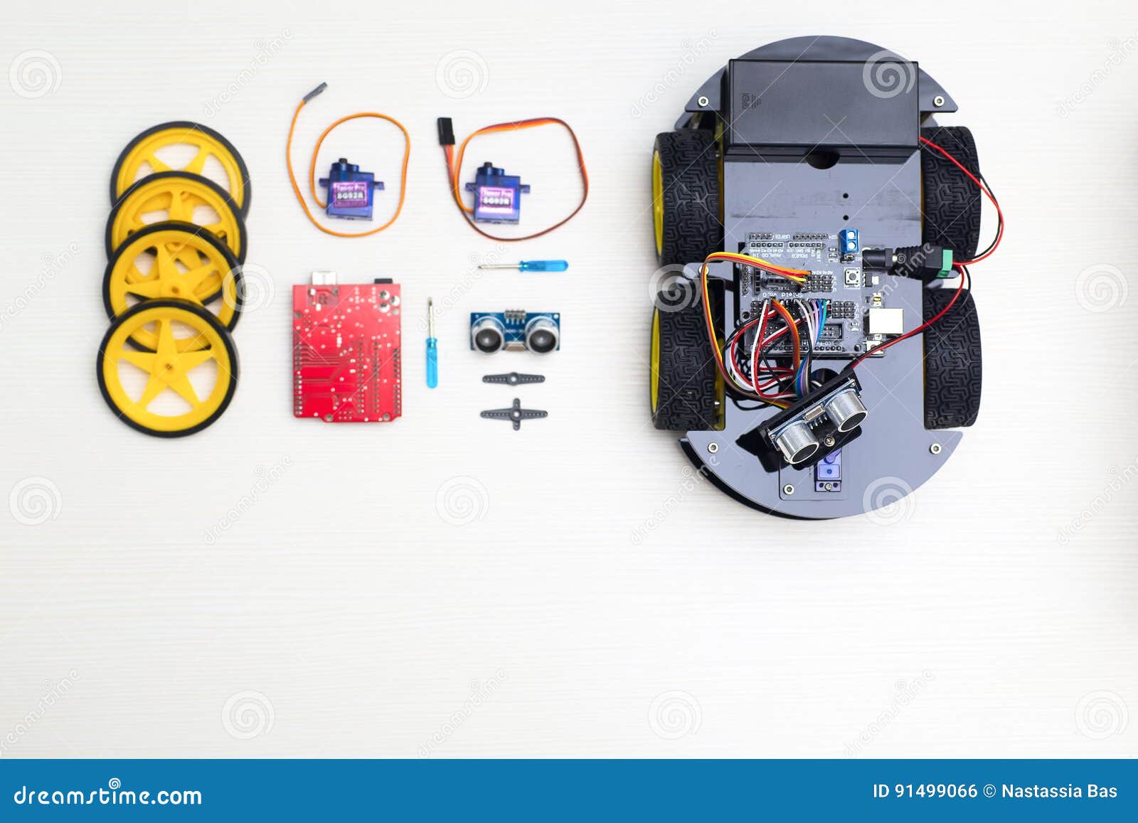Robot on Wheels and Elements for Robot Assembly. Flat Lay Stock Photo ...