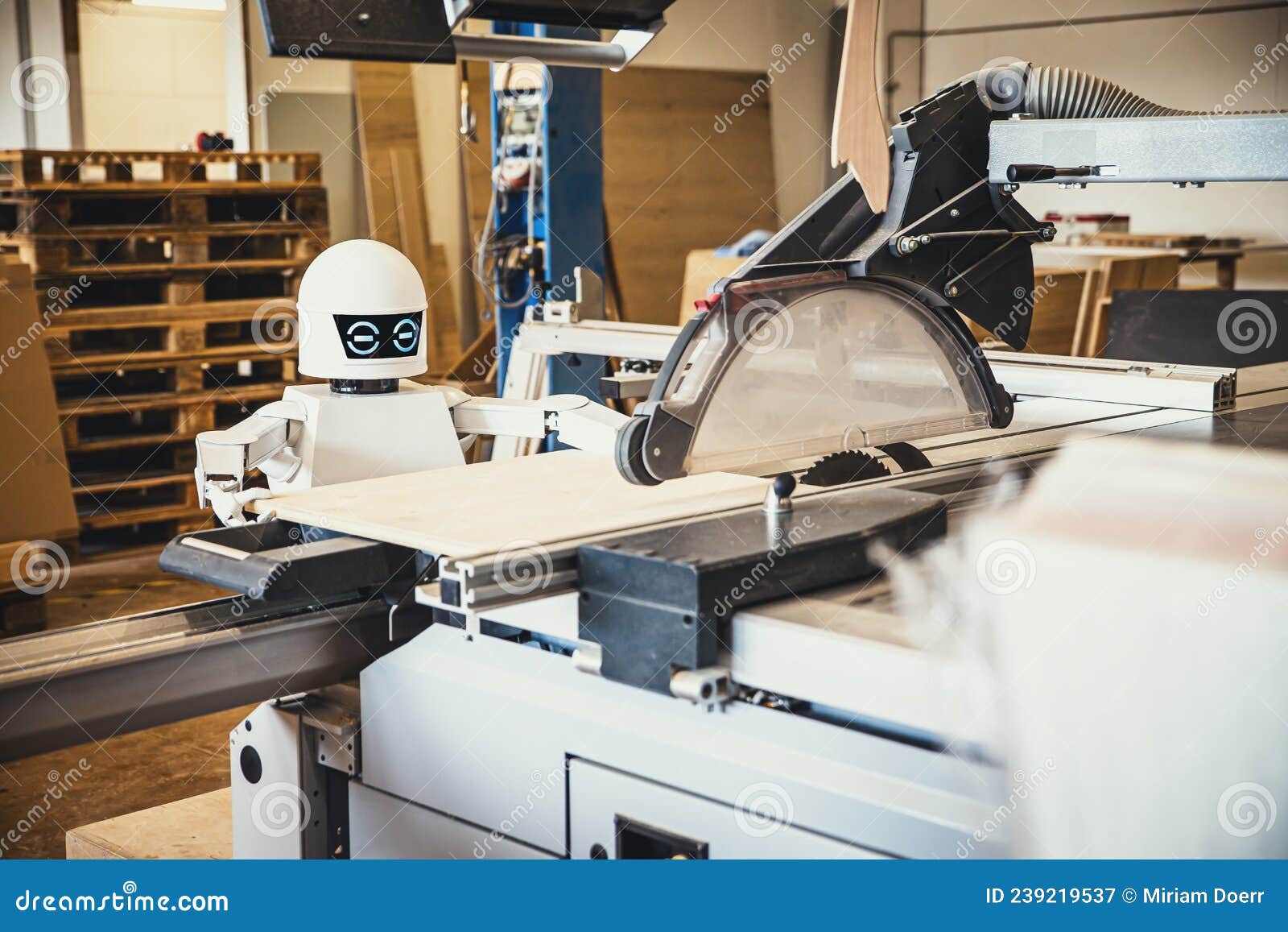 A Robot Works Fully Automatically in a Carpentry Workshop Stock Image ...