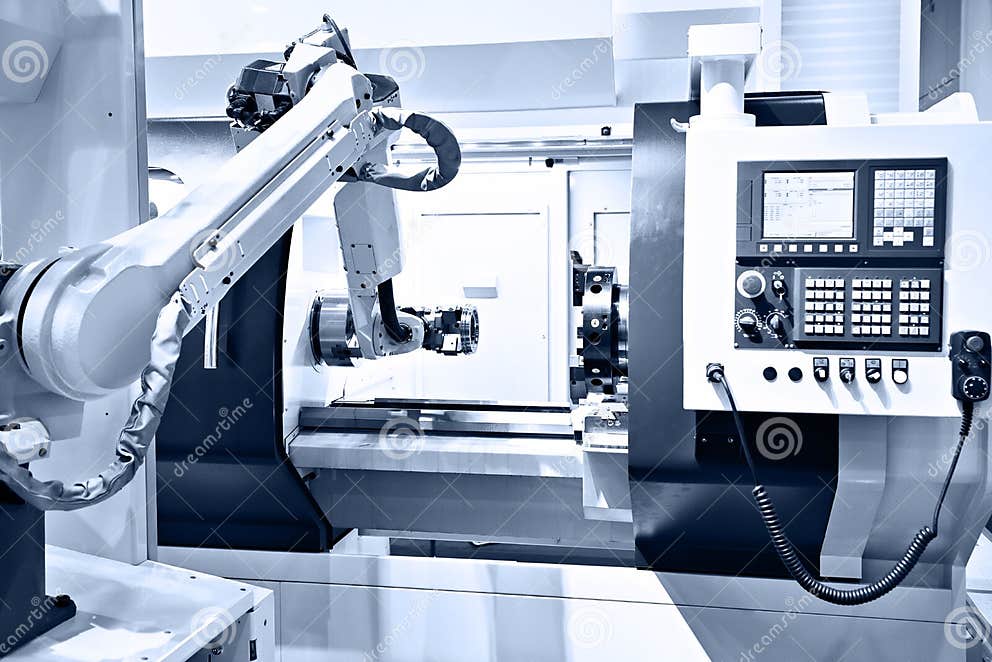 Robotic arm and cnc lathe stock photo. Image of technology - 154870098
