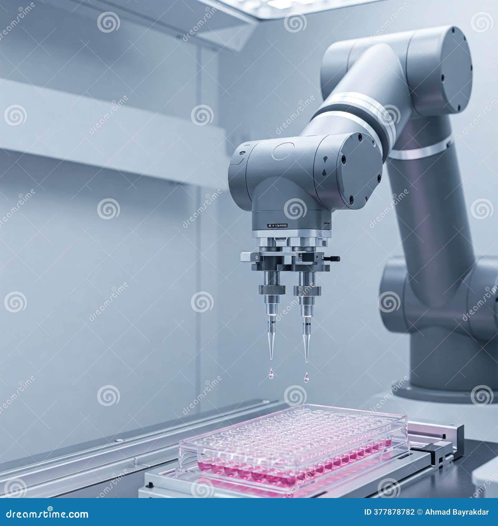 Robotic Arm Dispensing Liquid Into Glass Containers Royalty-Free Stock ...