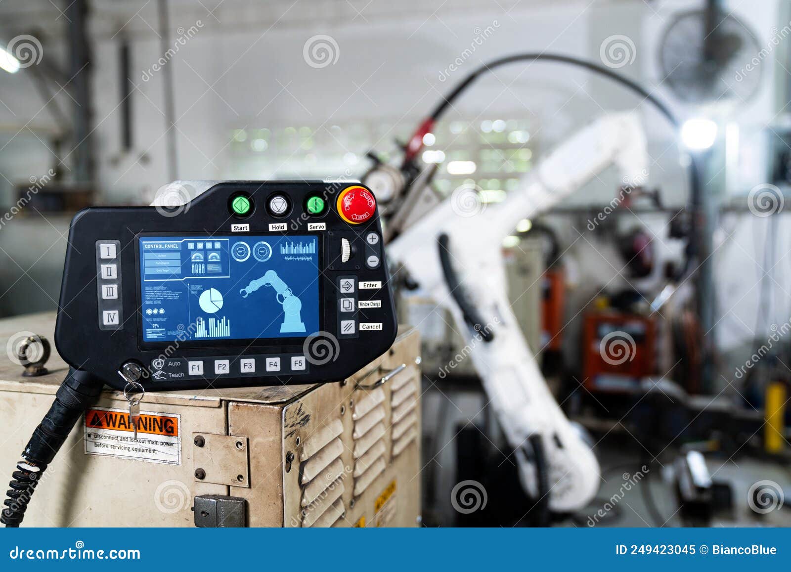 Robotic Arm and Its Controller Adept Panel in a Factory Workshop Stock ...