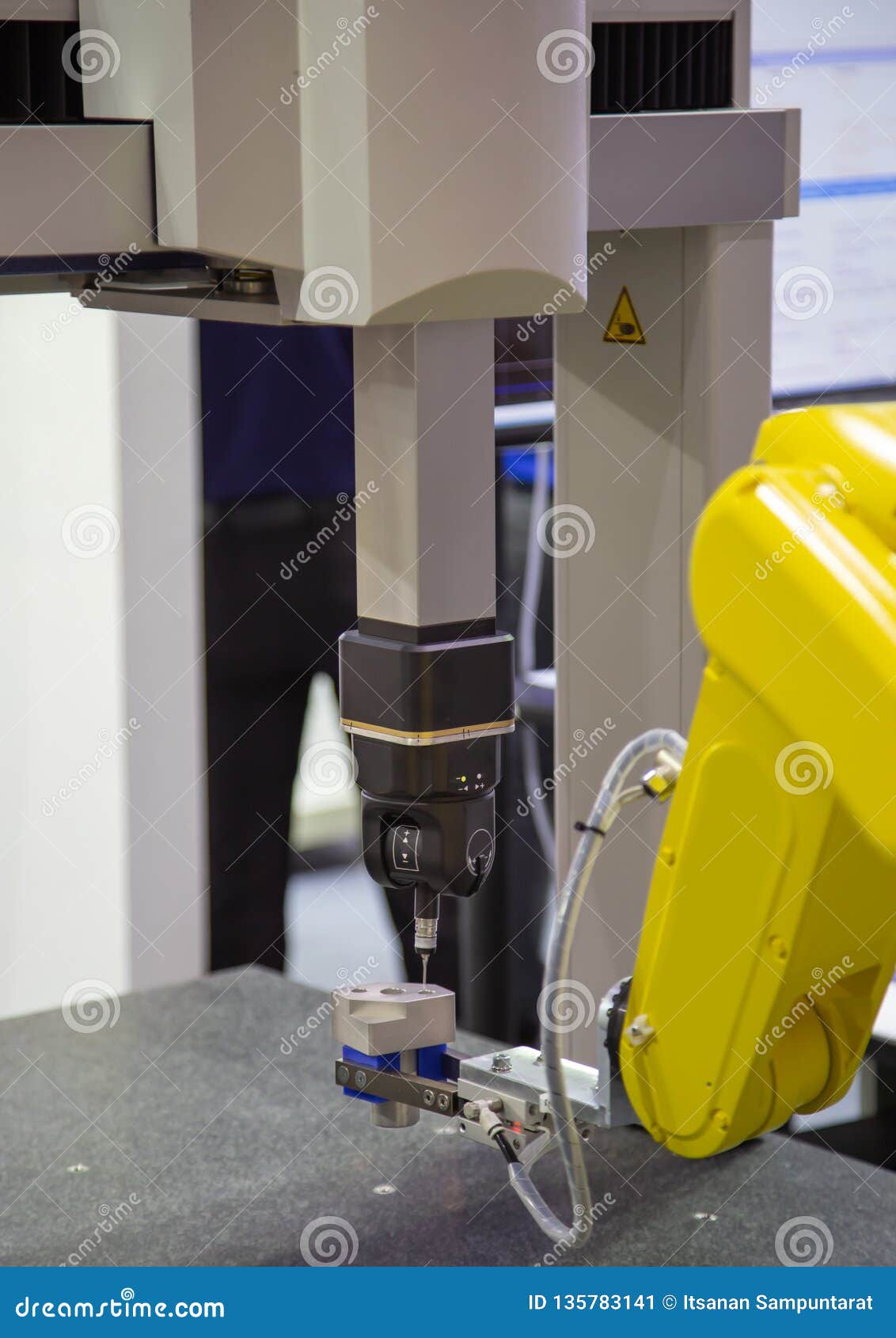 Robotic Arm Loading Workpiece To CMM Machine Stock Photo ...